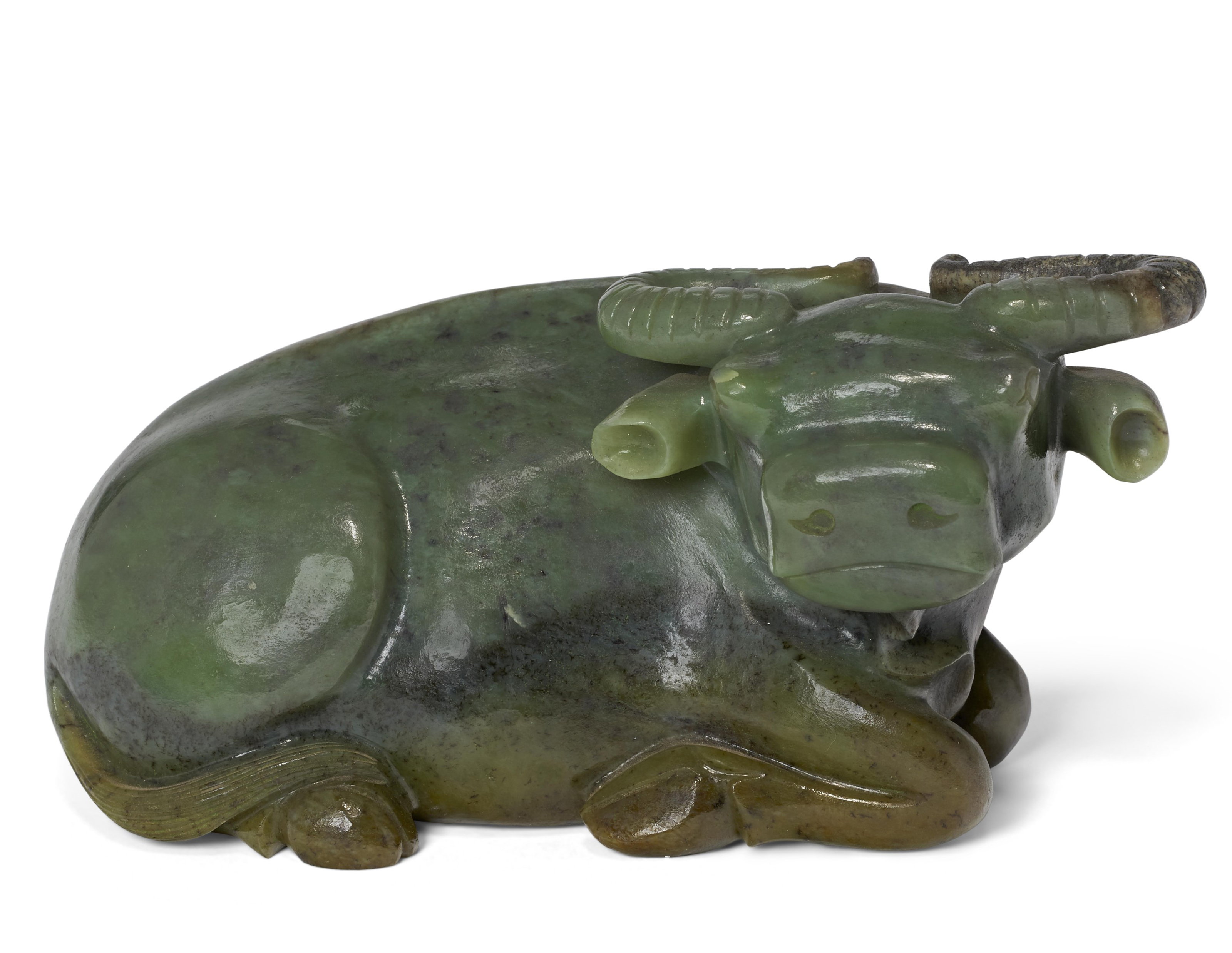 A GREEN JADE FIGURE OF A BUFFALO, | Christie’s