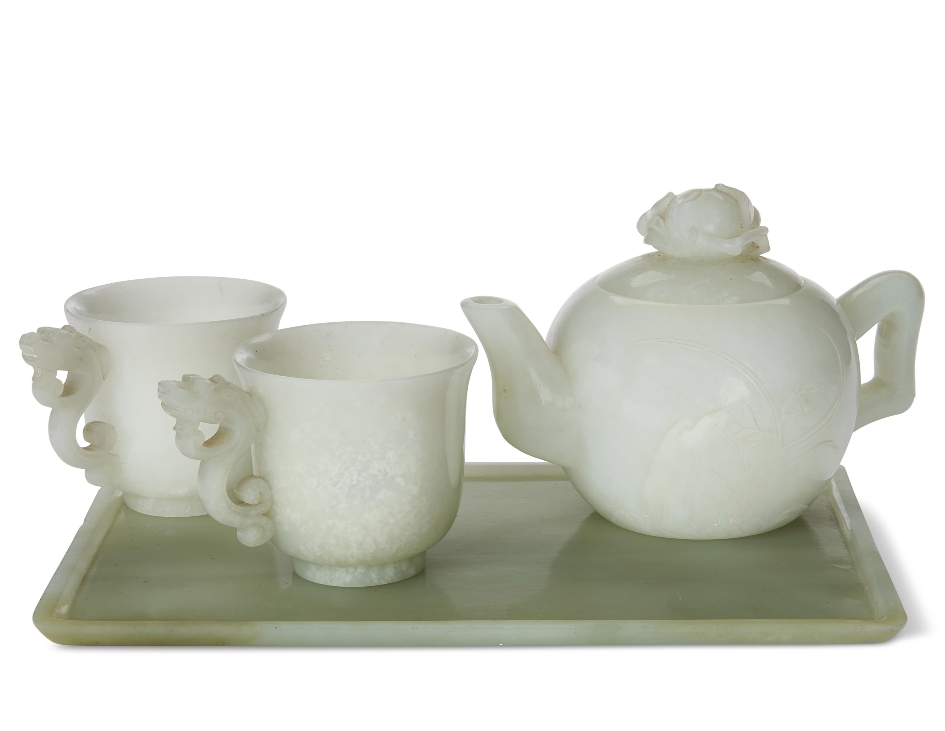 A WHITE JADE TEAPOT AND COVER, TWO CUPS AND A TRAY, | Christie’s