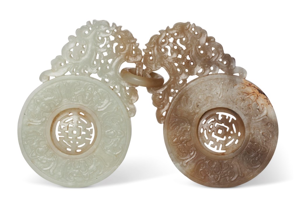A PAIR OF CONJOINED WHITE AND BEIGE JADE PLAQUES, | Christie’s