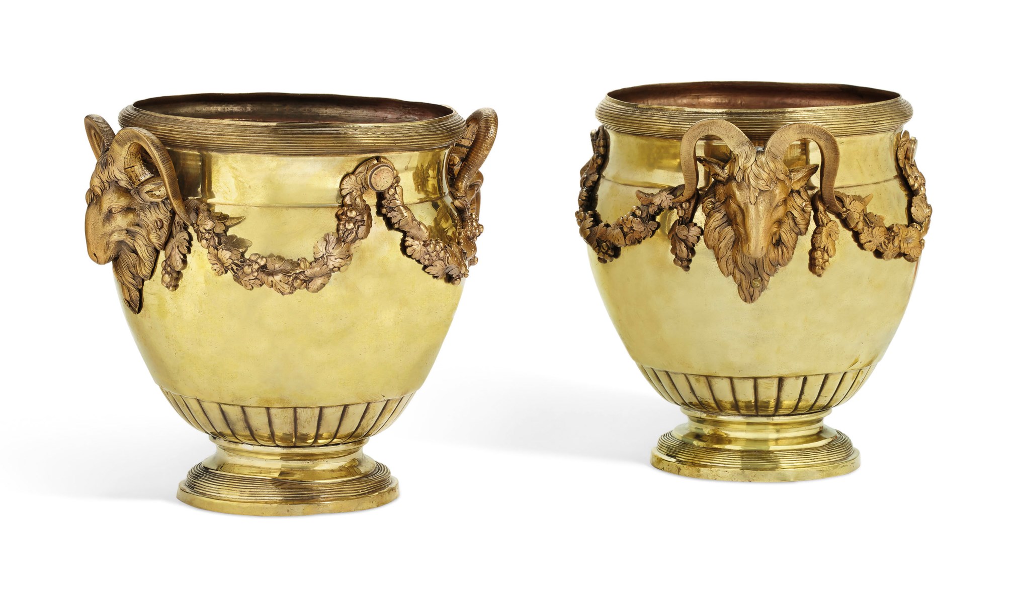 A PAIR OF NORTH EUROPEAN BRASS CACHE-POTS, 19TH CENTURY | Christie's