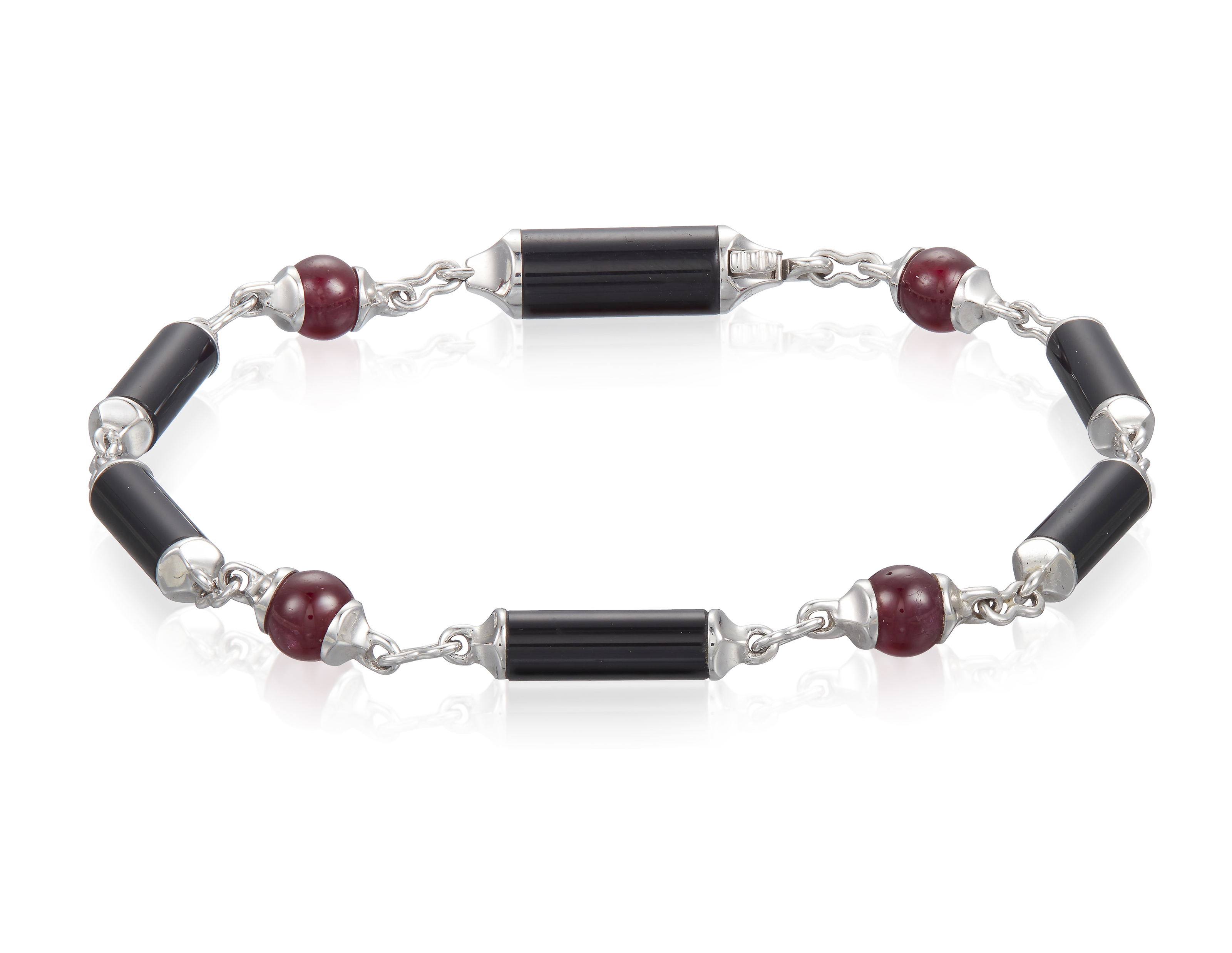 CARTIER 'LE BAISER DU DRAGON' ONYX AND RUBY BRACELET, | Christie’s