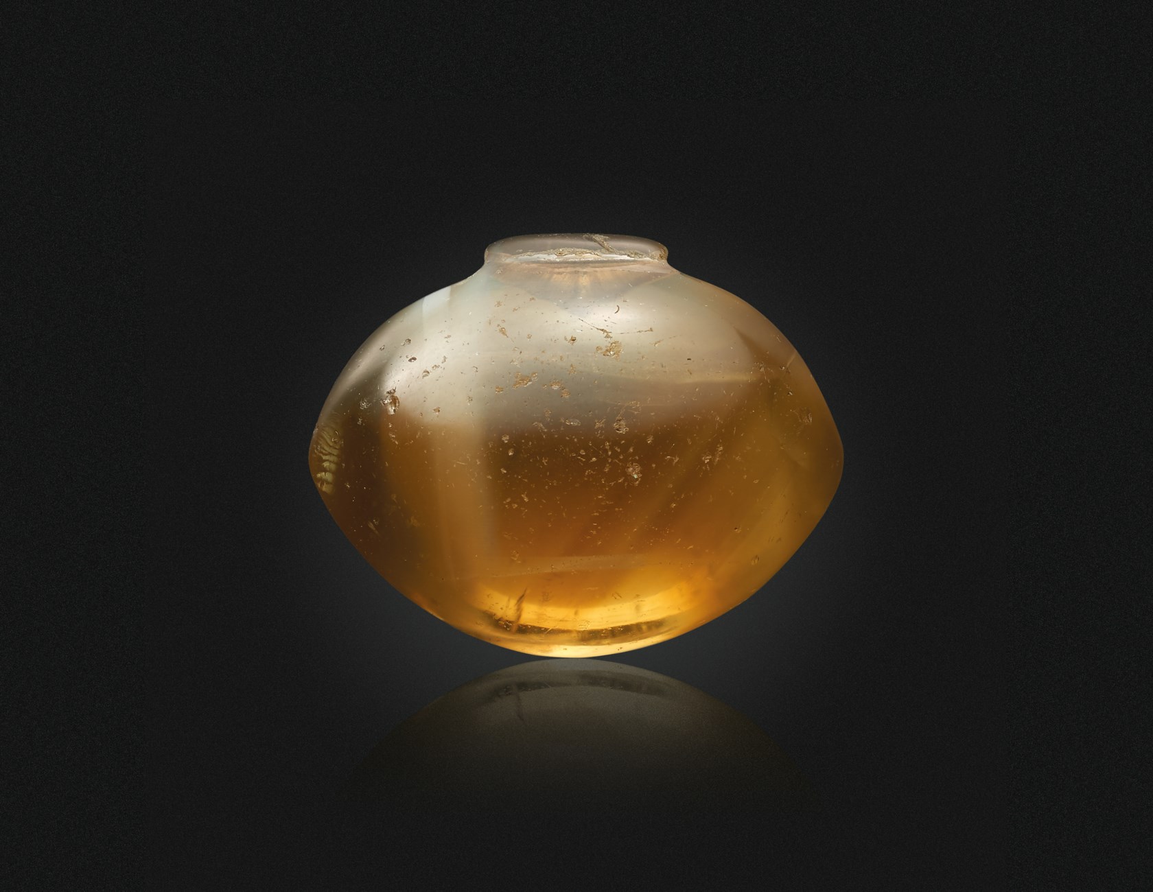A CAT'S EYE QUARTZ TAVEEZ BEAD | Christie's
