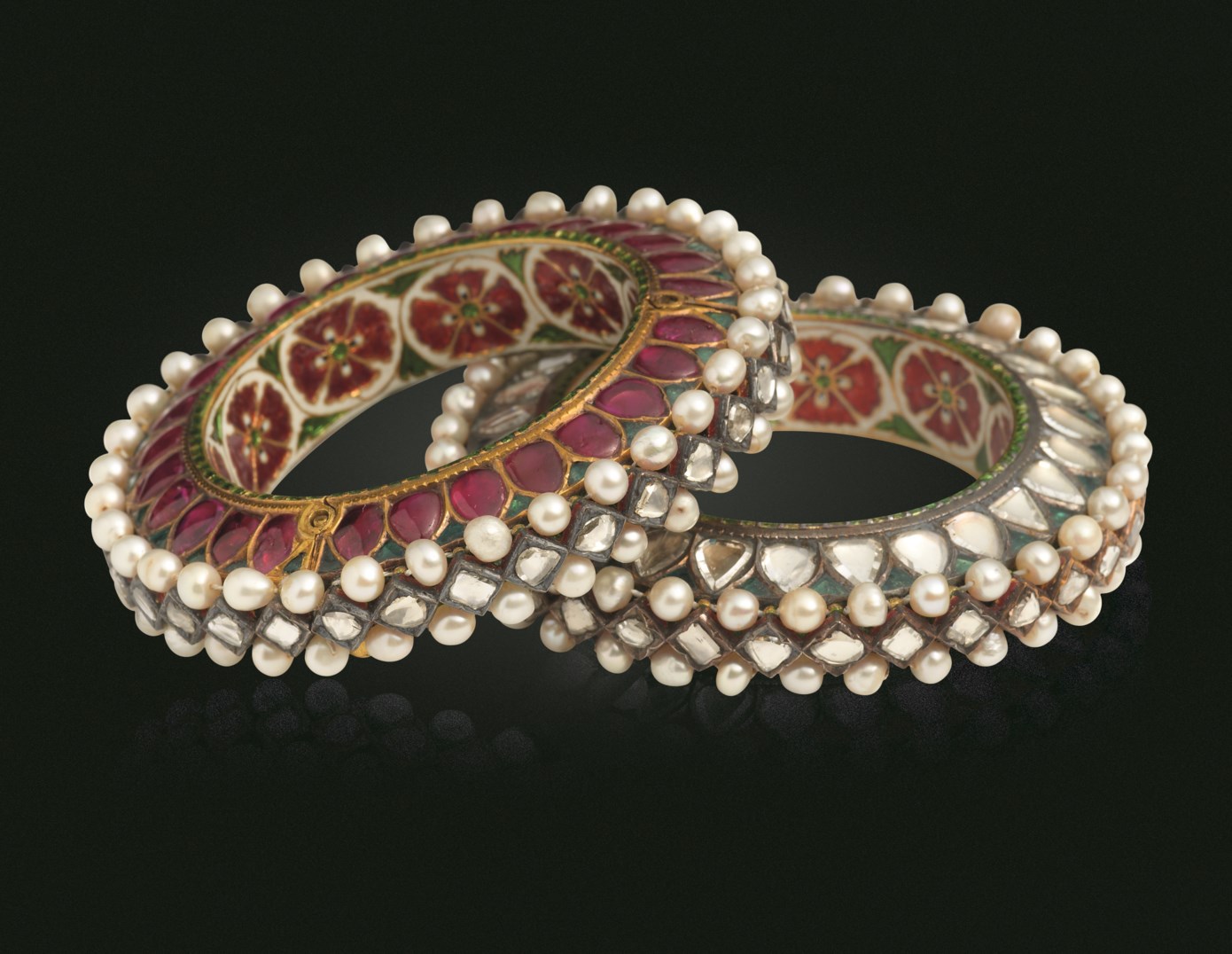 A PAIR OF ANTIQUE DIAMOND, ENAMEL AND MULTI-GEM KADAS | Christie's