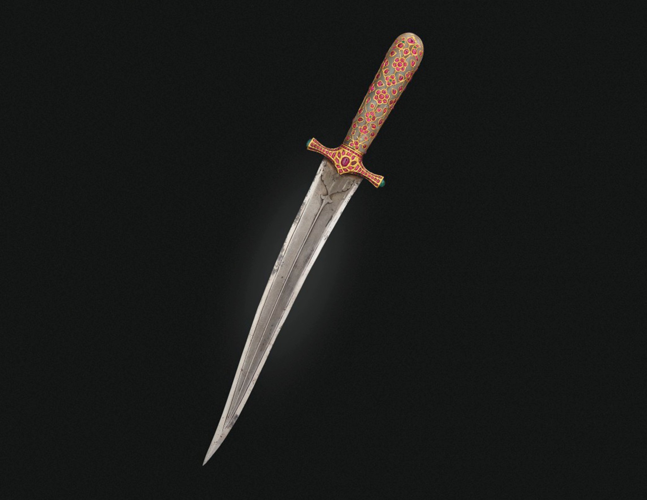 A GEM SET JADE HILTED DAGGER