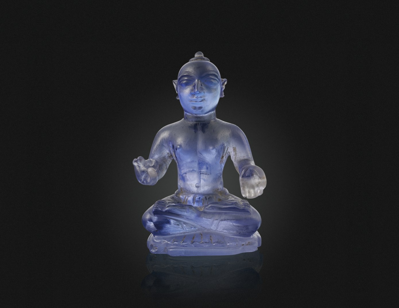 A CARVED SAPPHIRE HINDU SAINT | Christie's