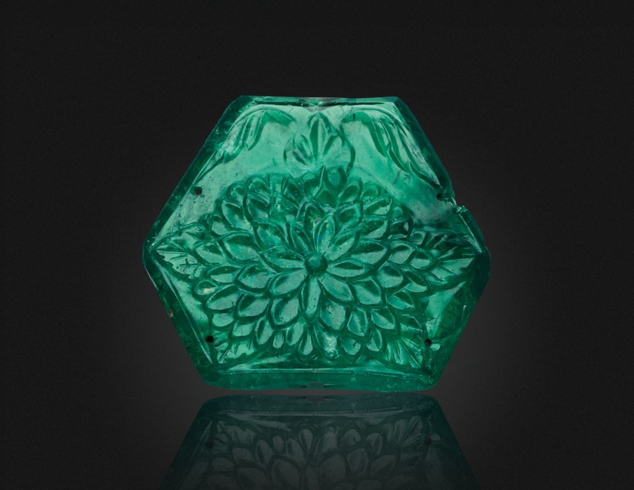 A CARVED EMERALD | Christie's