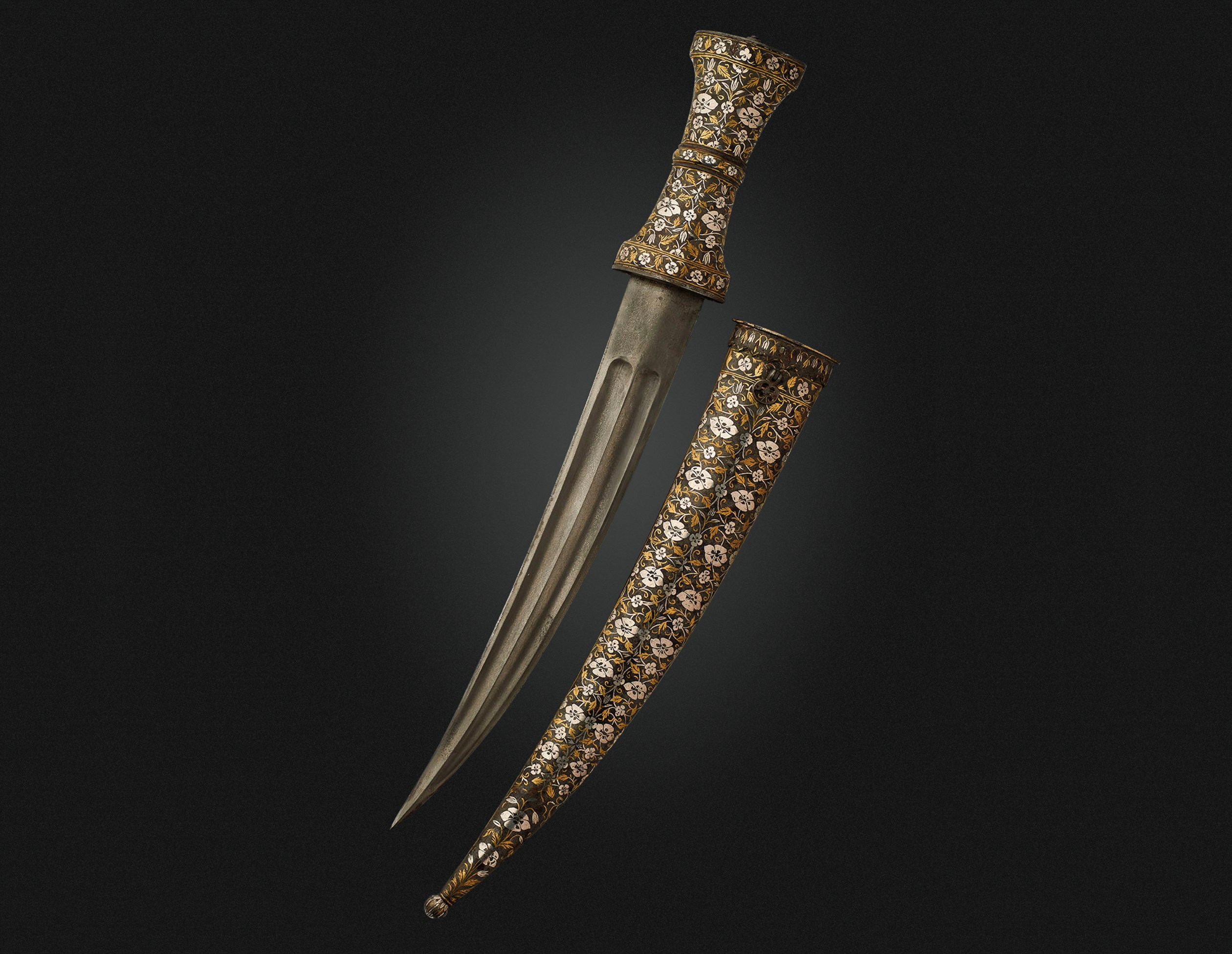A DAGGER (KHANJAR) WITH EXCEPTIONALLY FINE SILVER AND BRASS-INLAID HILT ...