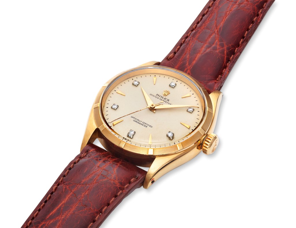 ROLEX, 18K WITH DIAMOND HOUR MARKERS, REF. 6285, | Christie’s