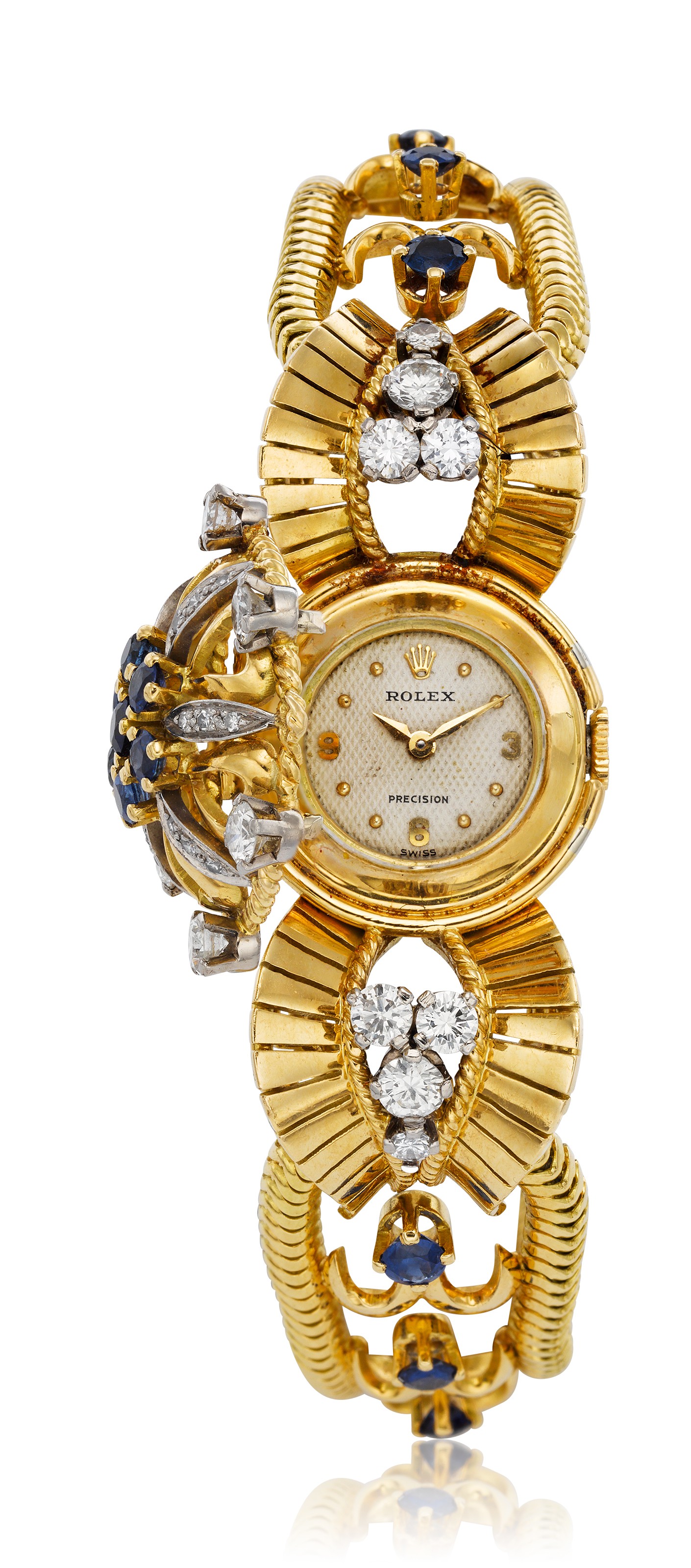 ROLEX, LADIES’ 18K, DIAMOND, AND SAPPHIRE CONCEALED WATCH, | Christie’s