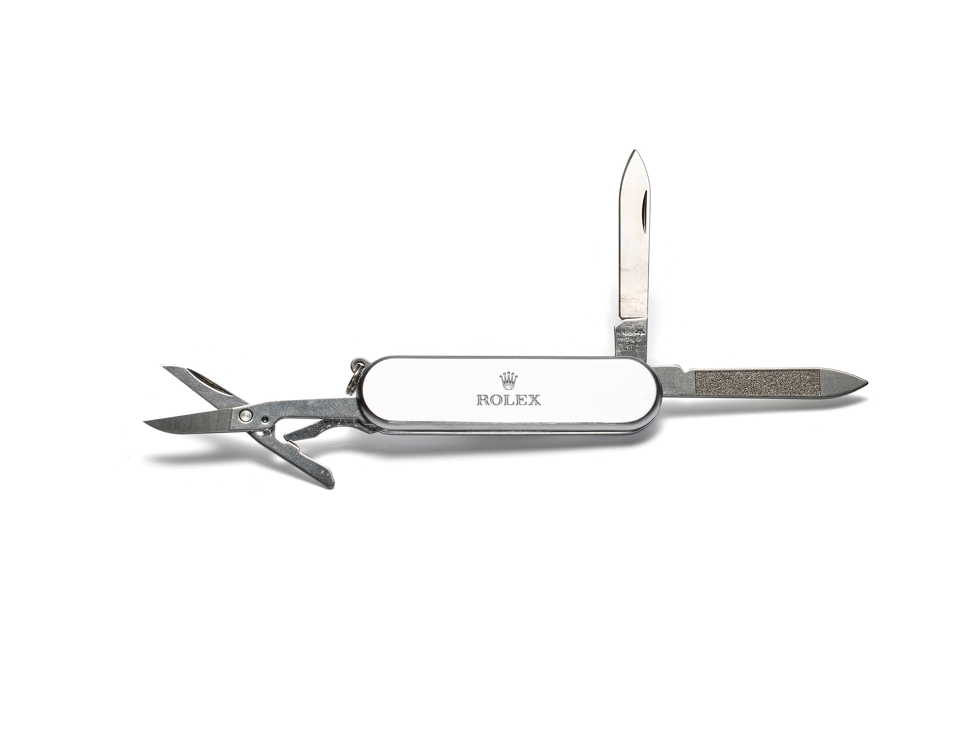 ROLEX, A STAINLESS-STEEL POCKET KNIFE, | Christie’s