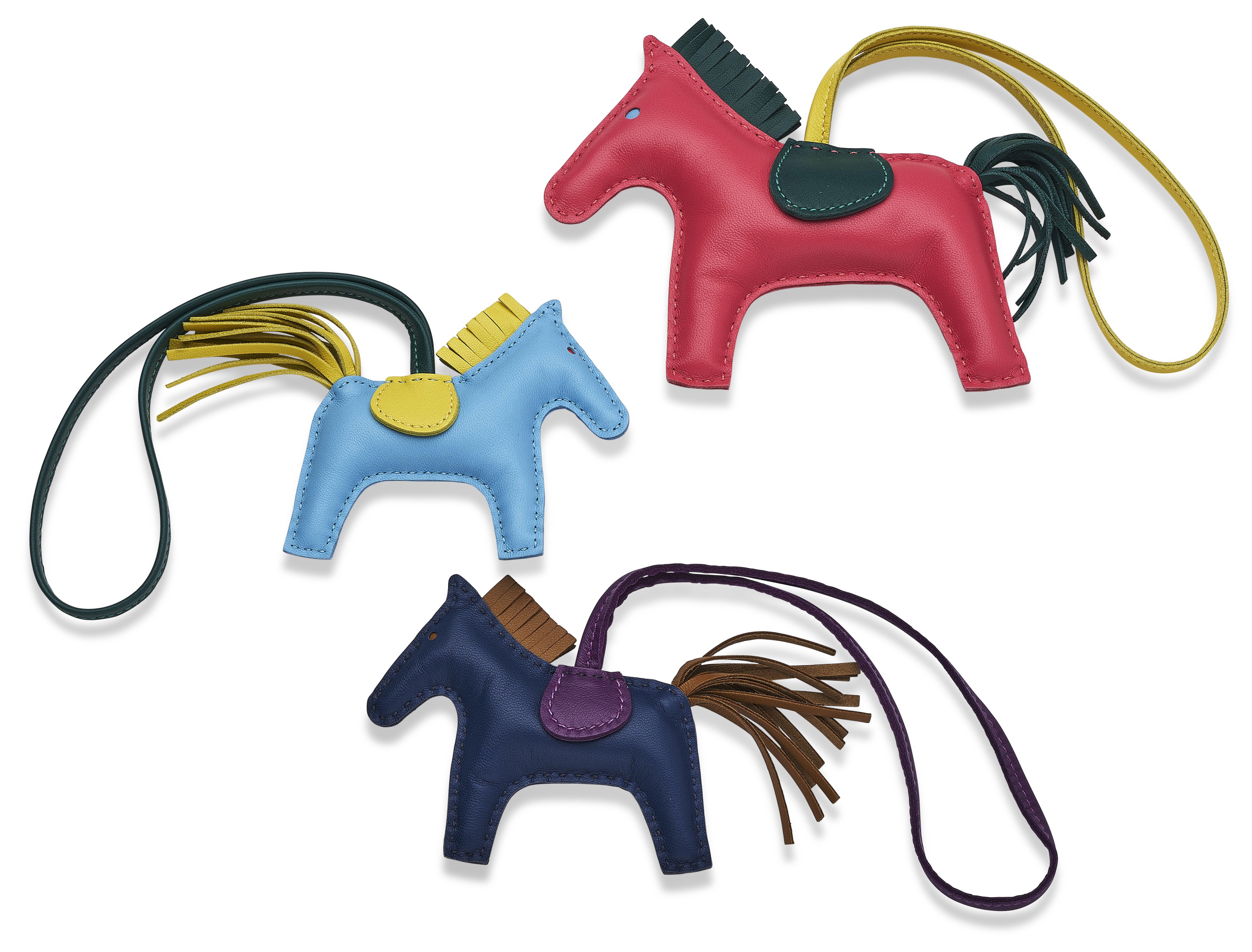 A SET OF THREE: MILO LEATHER GRIGRI PM & MM RODEO CHARMS, HERMÈS, 2010s ...