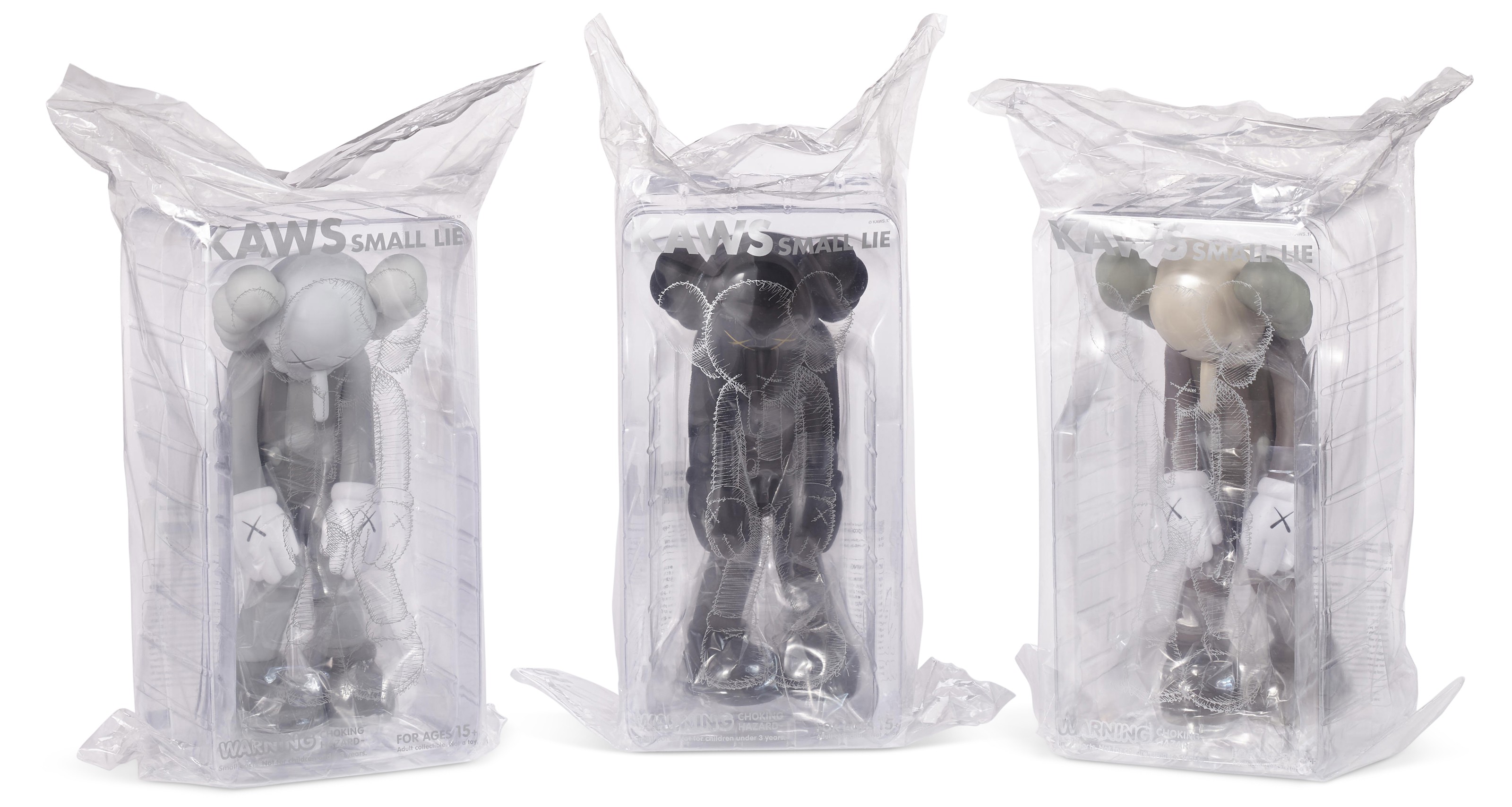 KAWS (b. 1974), Three works (Small Lie Brown, Small Lie Black and Small ...