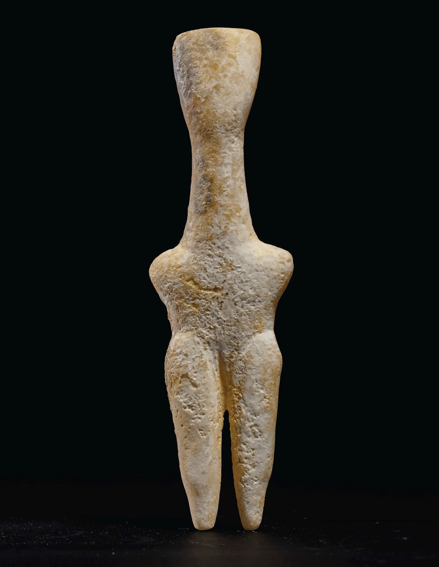 A CYCLADIC MARBLE FEMALE FIGURE