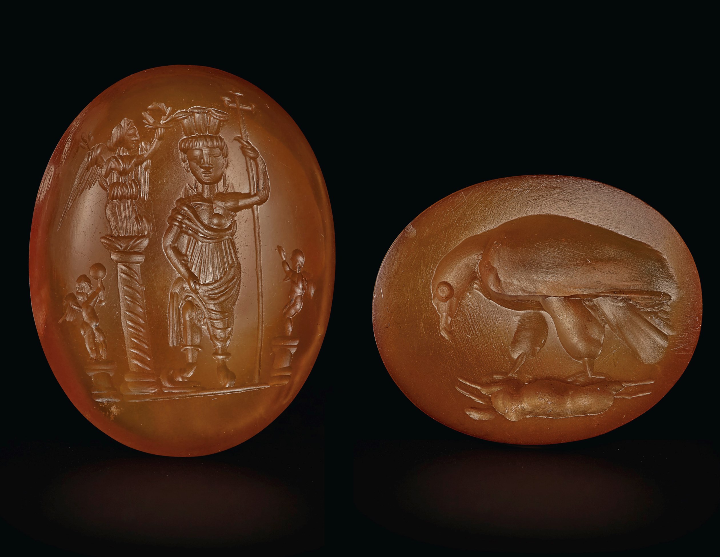 A GREEK AND ROMAN DOUBLE-SIDED ENGRAVED CARNELIAN GEM, CIRCA 4TH ...