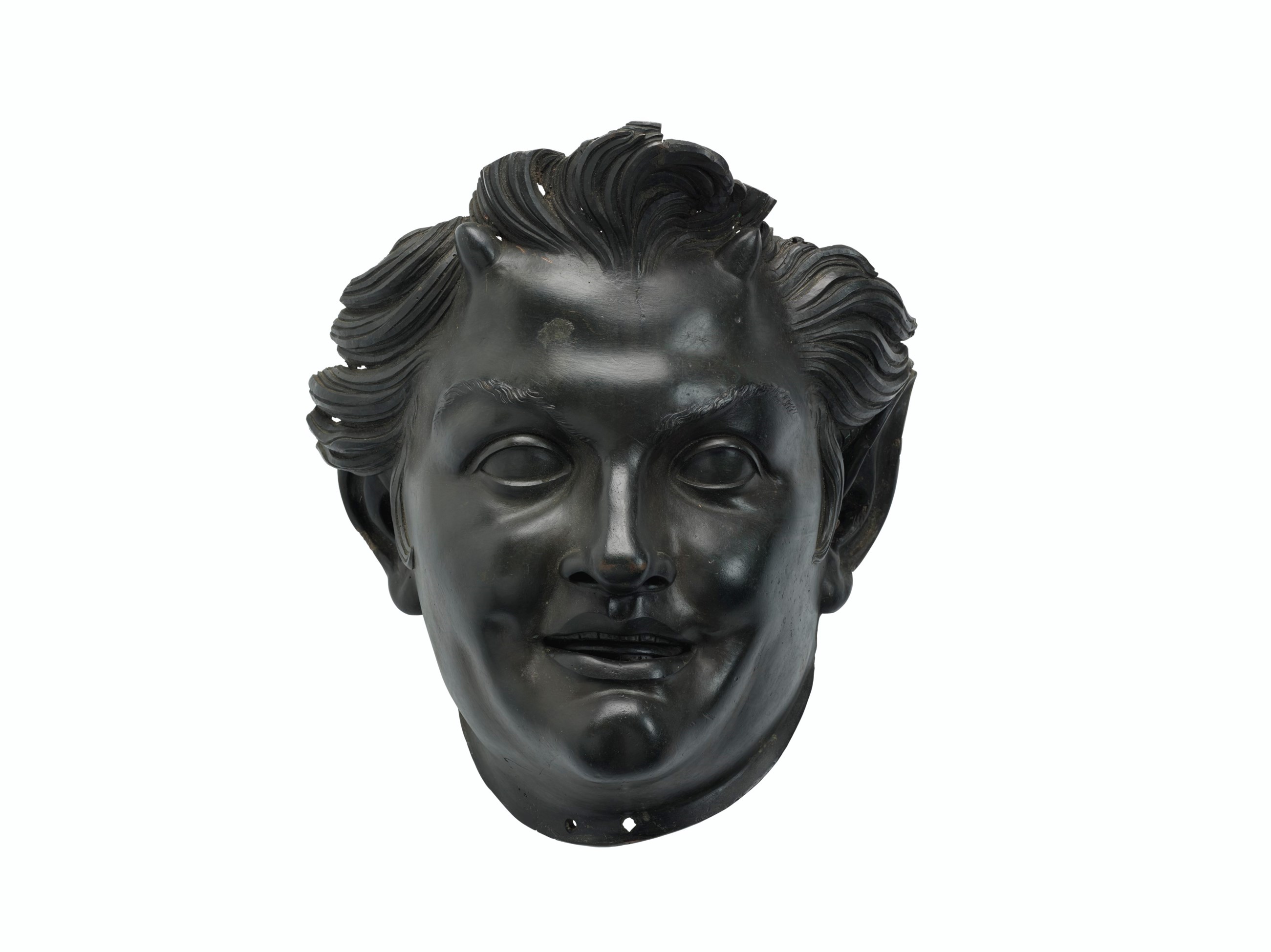 A LARGE BRONZE MASK OF A FAUN