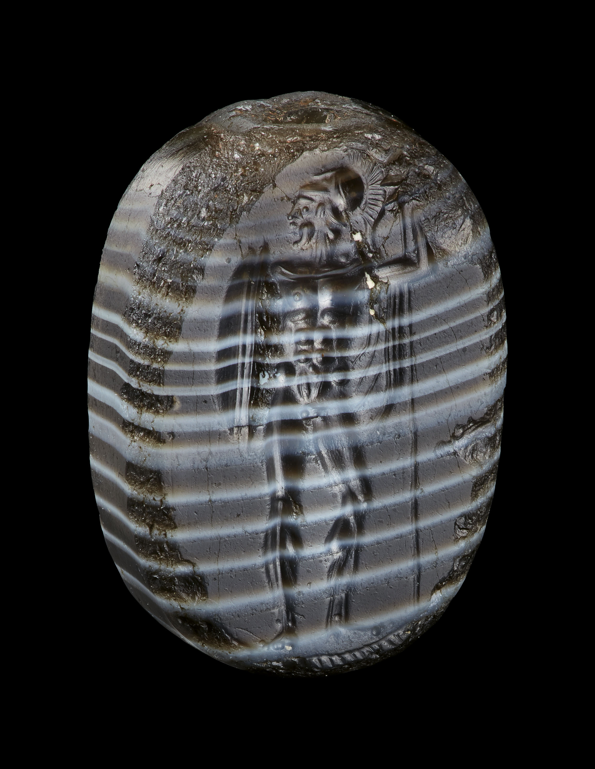 A GREEK BANDED AGATE SCARABOID WITH A WARRIOR