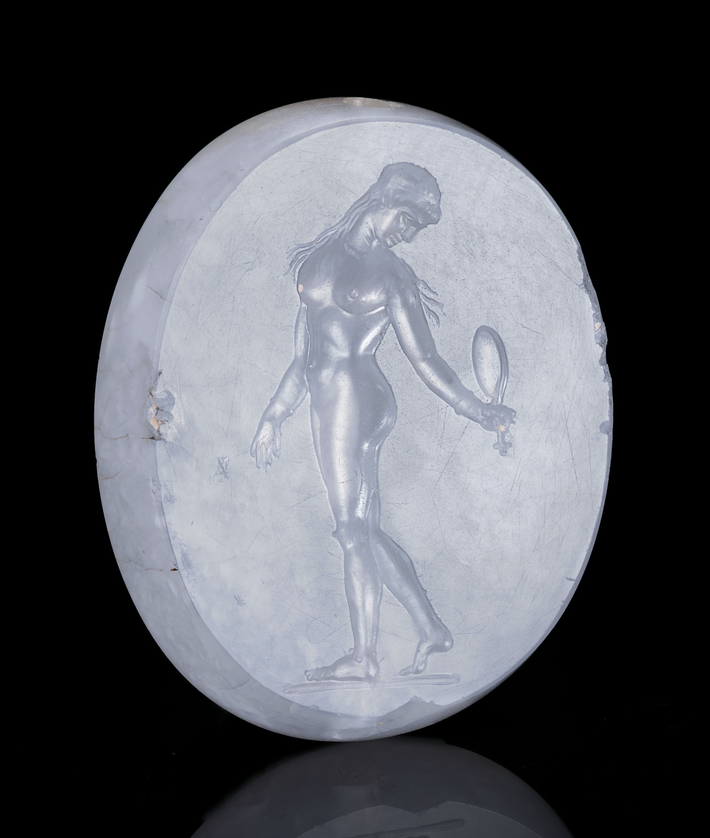 A GREEK CARNELIAN SCARAB WITH A NUDE ARCHER, ARCHAIC PERIOD, CIRCA ...