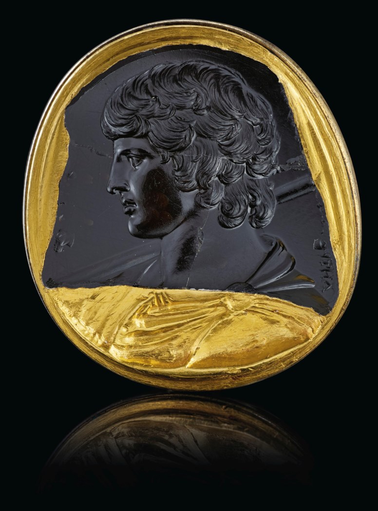 A ROMAN BLACK CHALCEDONY INTAGLIO PORTRAIT OF ANTINOUS