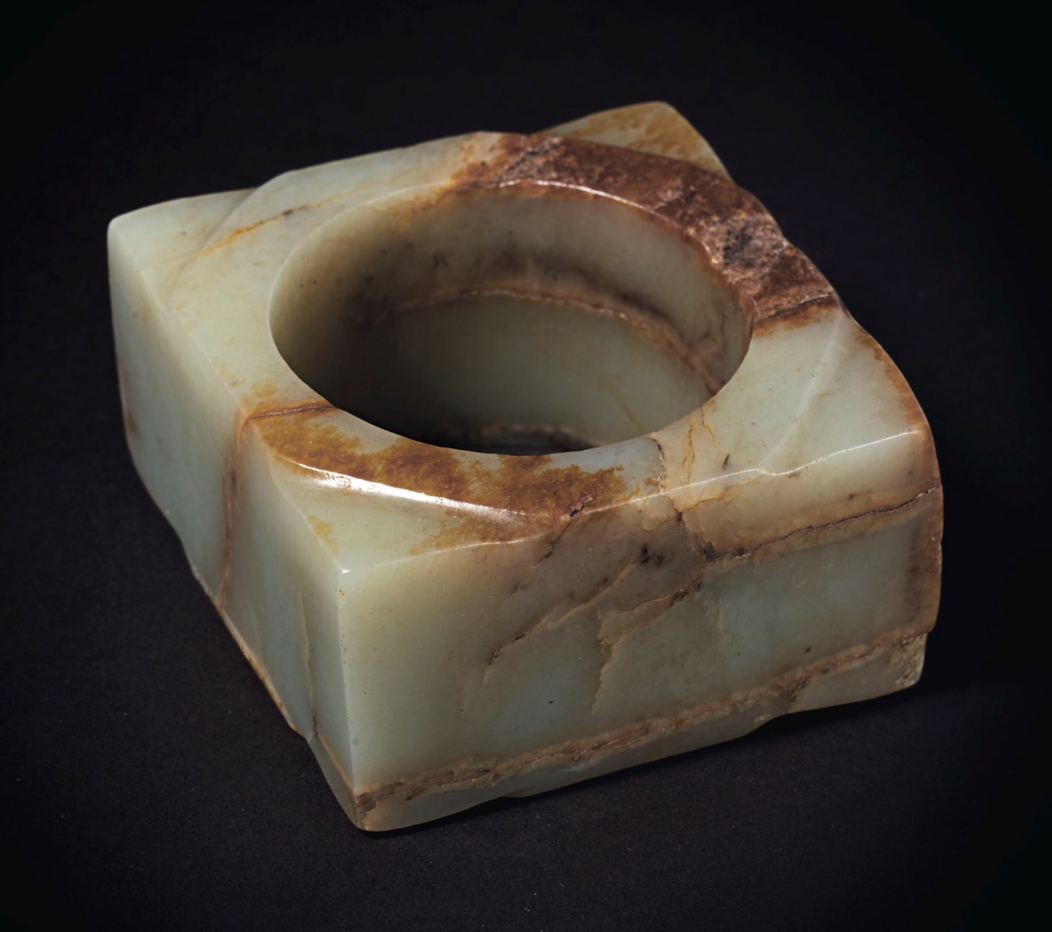 A PALE GREYISH GREEN AND RUSSET JADE CONG, CHINA, MING-QING DYNASTY ...