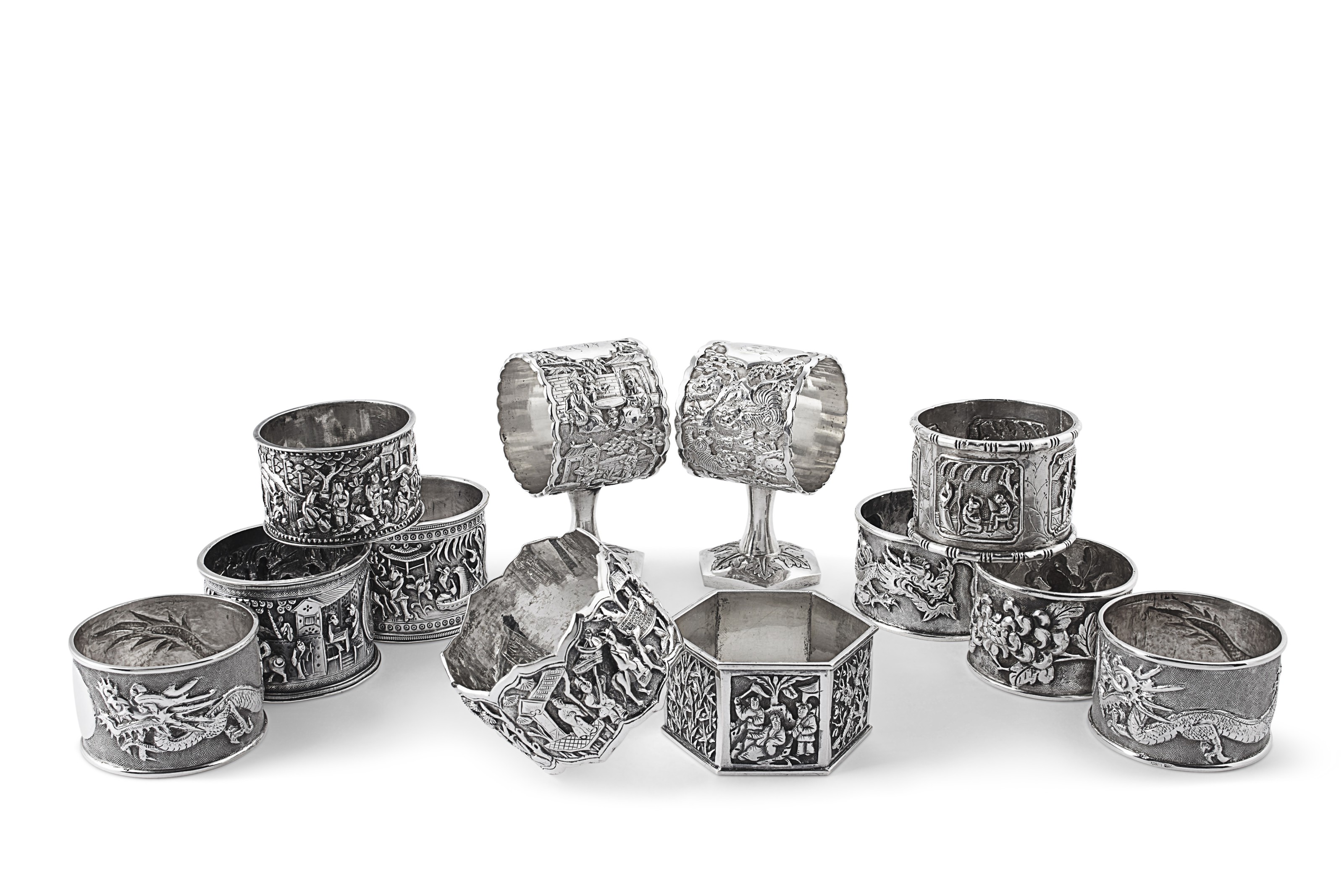 A GROUP OF TWELVE CHINESE EXPORT SILVER NAPKIN RINGS, VARIOUS MAKER'S ...