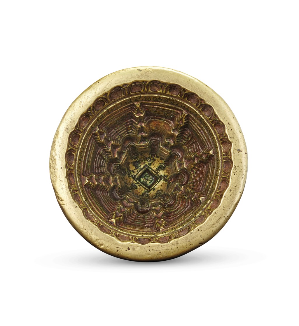A BRONZE TSA-TSA MOLD, TIBET, 17TH CENTURY | Christie’s
