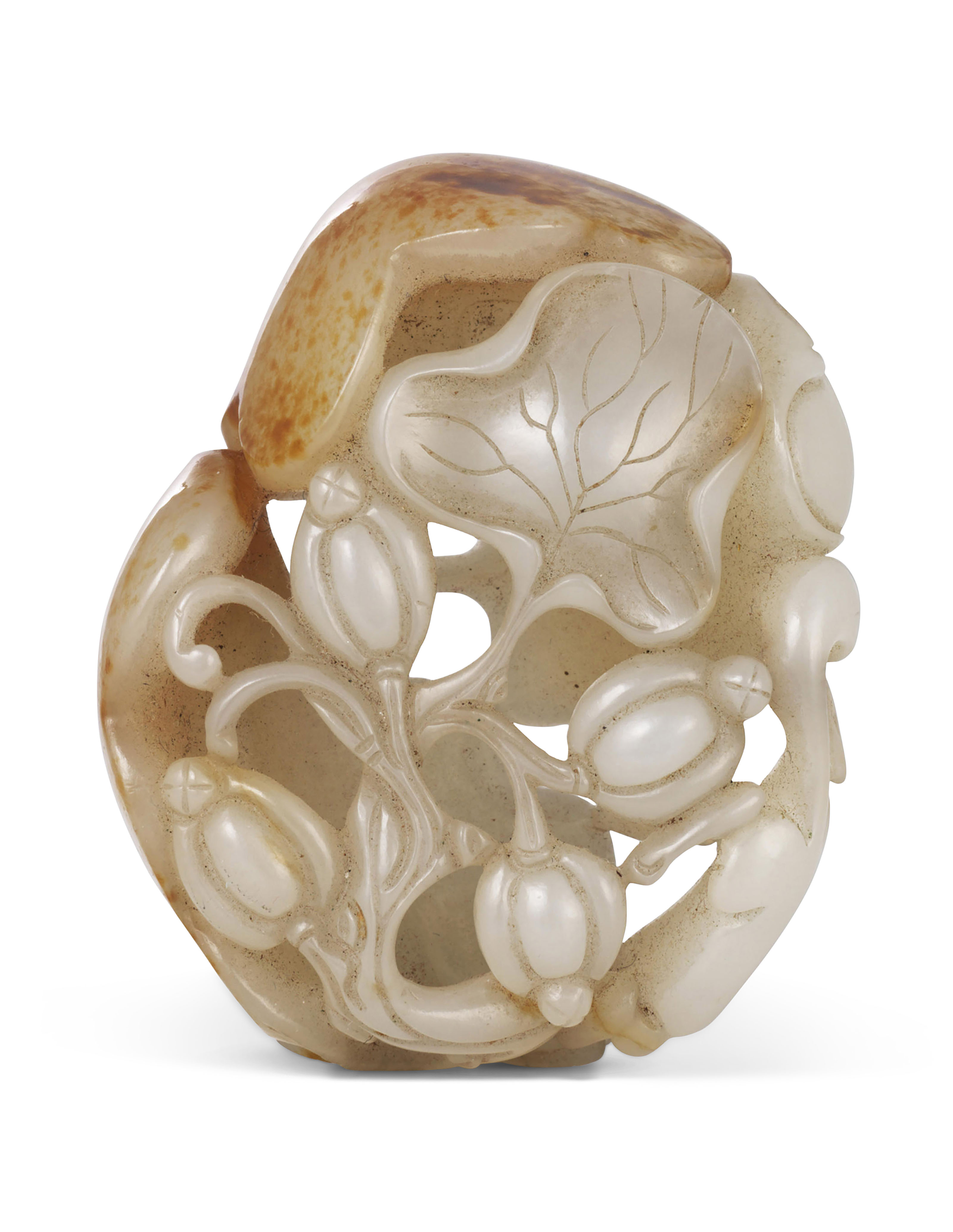 A GREYISH-WHITE AND RUSSET JADE RETICULATED PENDANT, 18TH-19TH CENTURY ...