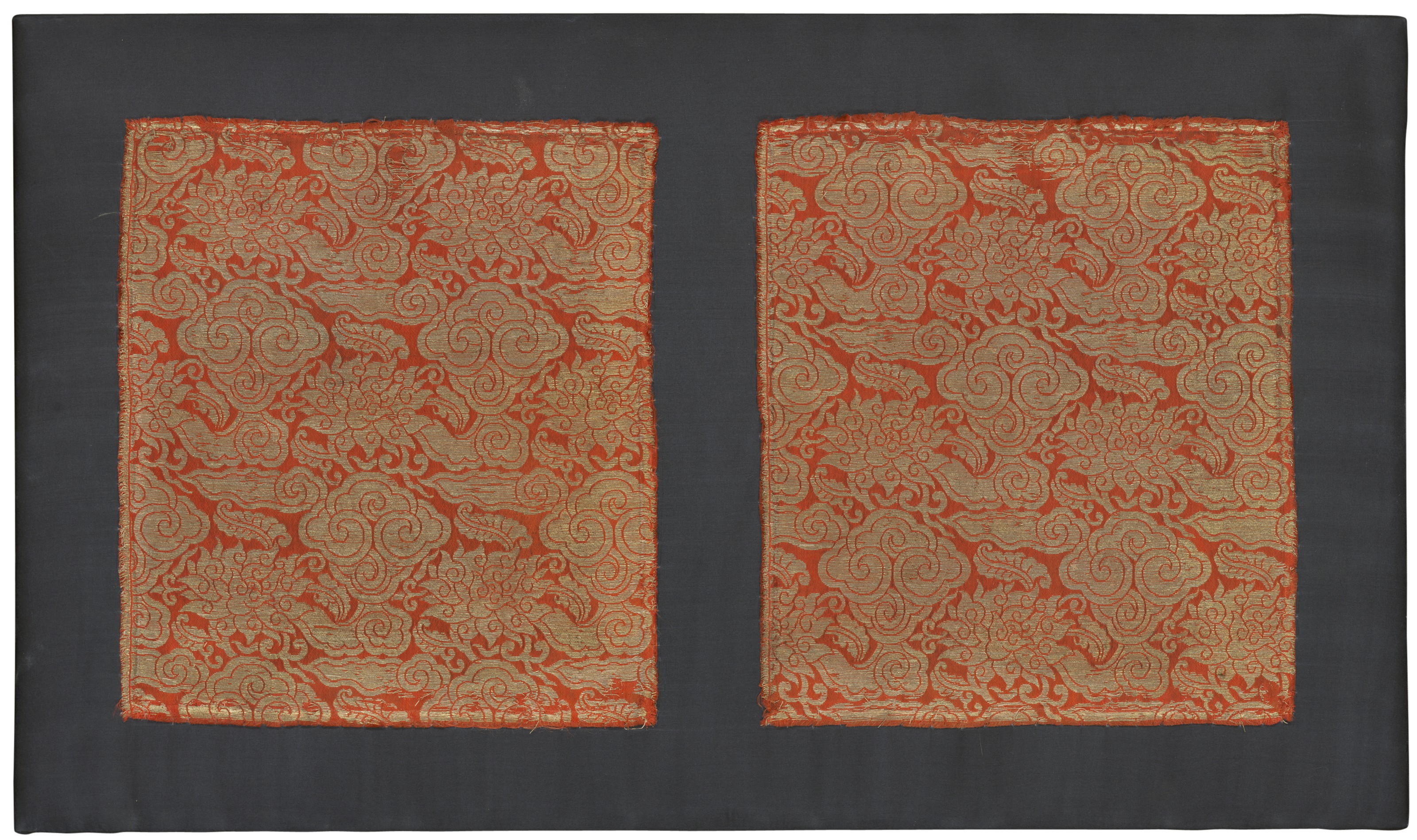 TWO RED SILK AND GOLD BROCADE 'LOTUS AND CLOUD' PANELS, MING DYNASTY ...