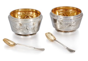 A PAIR OF PARCEL-GILT SILVER SALT CELLARS AND SPOONS, MARKED K. FABERGÉ ...