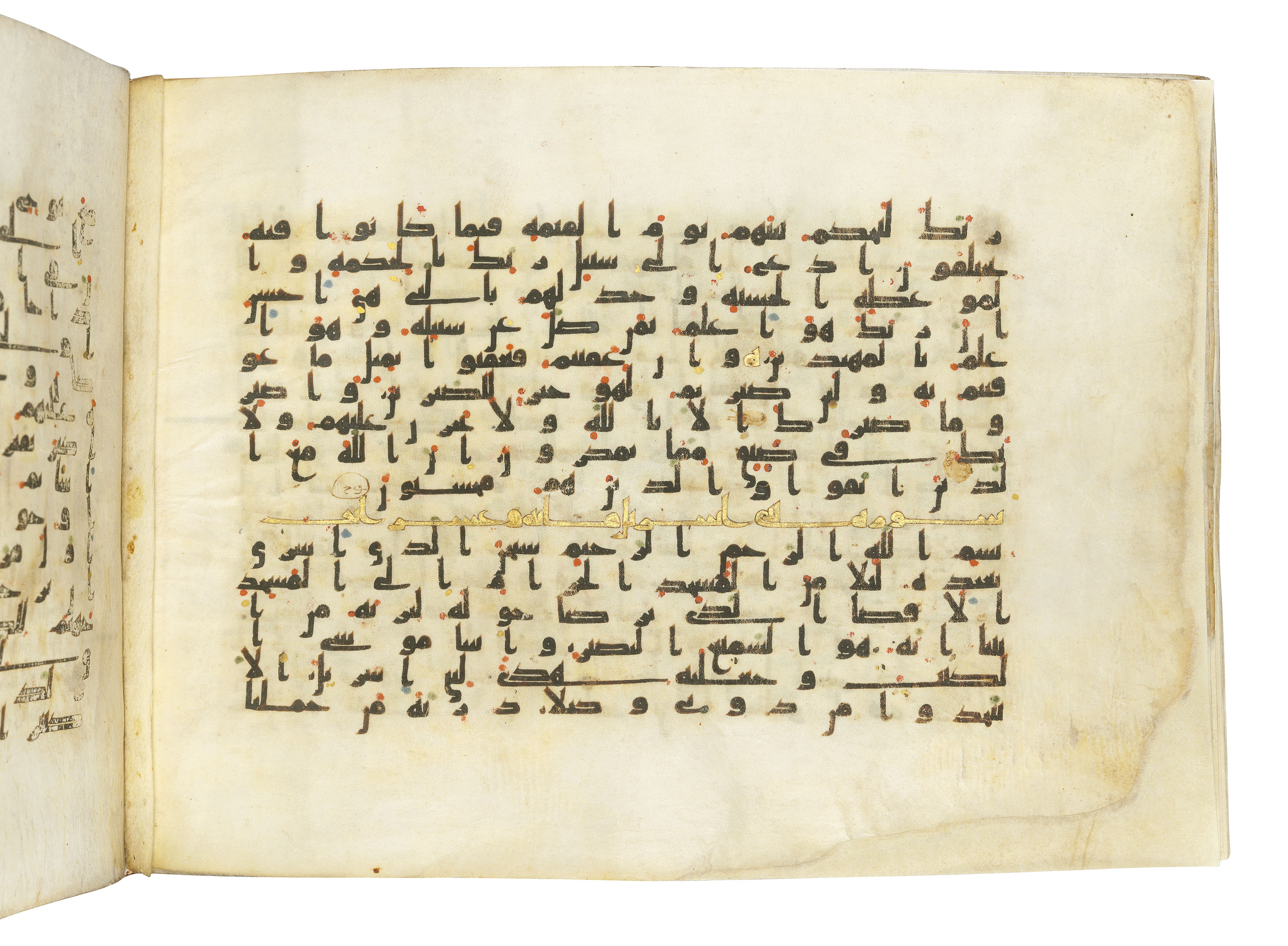 A KUFIC QUR'AN SECTION - auctions & price archive
