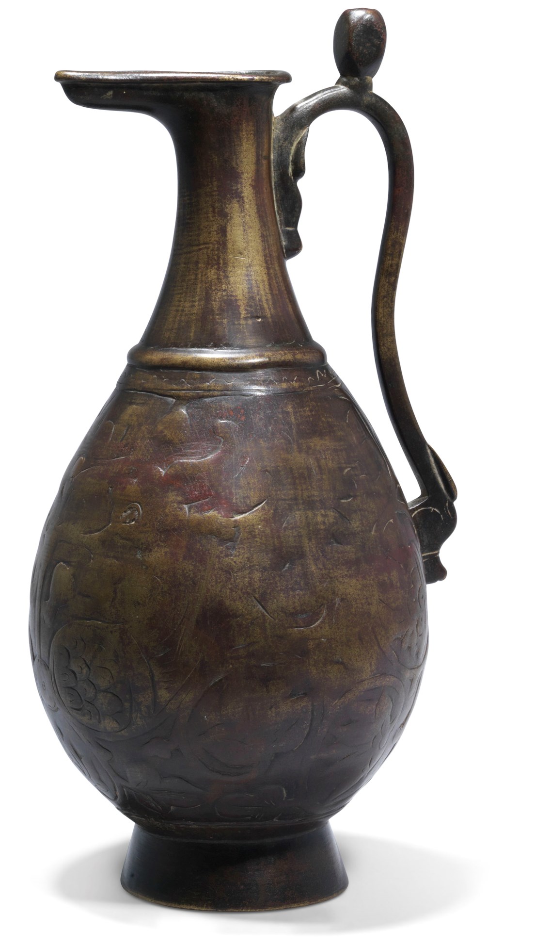 AN EARLY ISLAMIC BRONZE EWER, PROBABLY MESOPOTAMIA, 8TH/9TH CENTURY ...