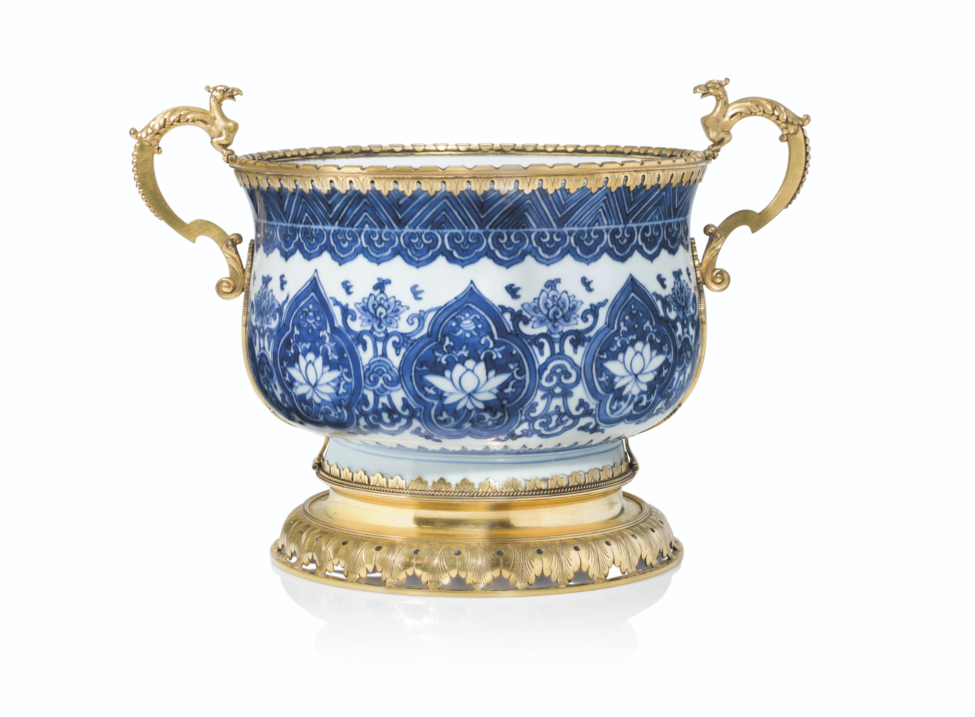 A NORTH EUROPEAN ORMOLU-MOUNTED CHINESE BLUE-AND-WHITE PORCELAIN CACHE-POT