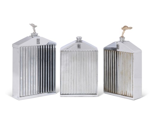 A GROUP OF NINE CHROMIUM-PLATED NOVELTY FLASKS, MOST BY RUDDSPEED ...