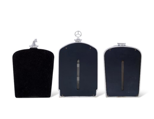 A GROUP OF NINE CHROMIUM-PLATED NOVELTY FLASKS, MOST BY RUDDSPEED ...