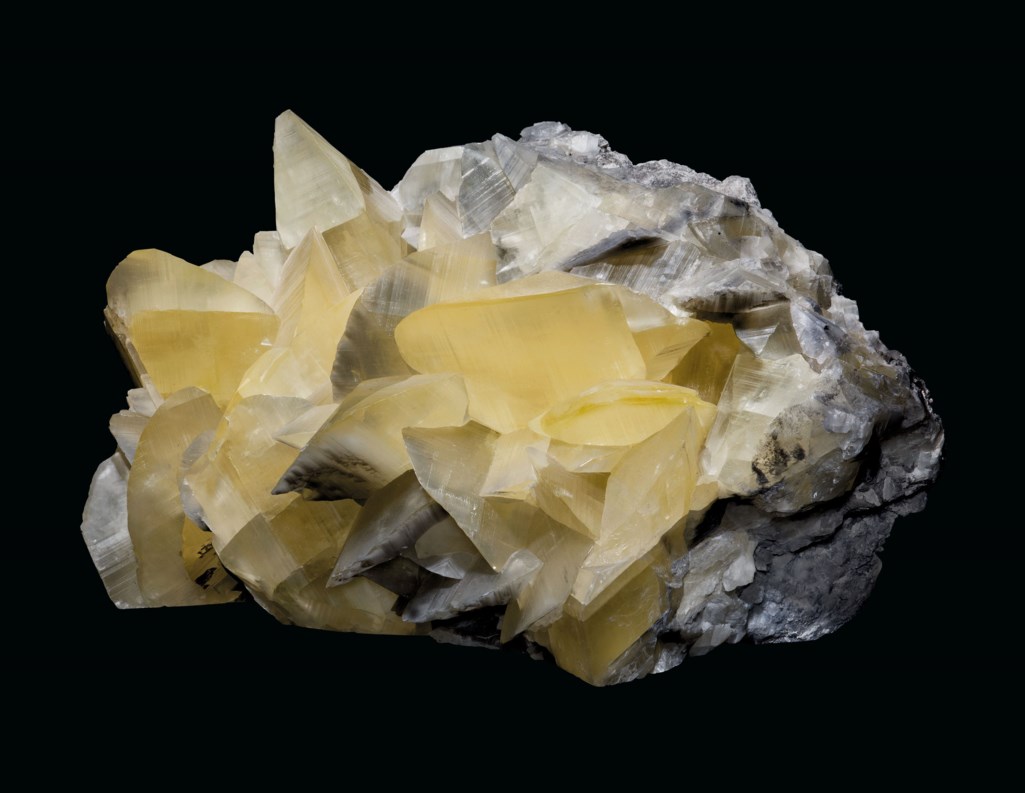 A CLUSTER OF LARGE YELLOW CALCITE CRYSTALS, CHINA | Christie’s
