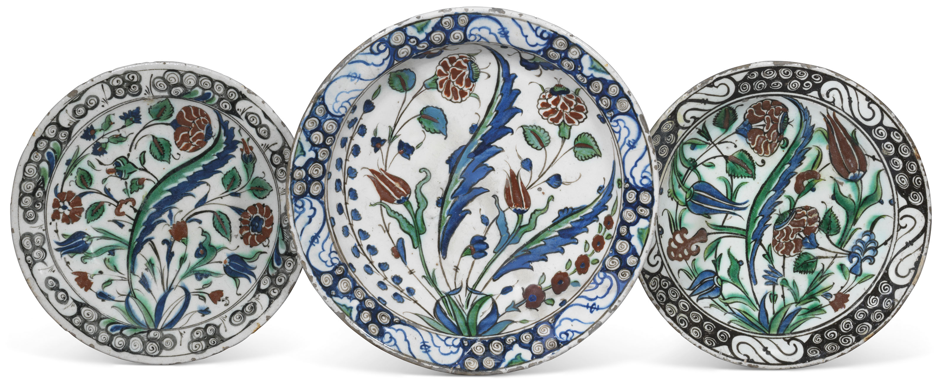 THREE IZNIK POTTERY DISHES