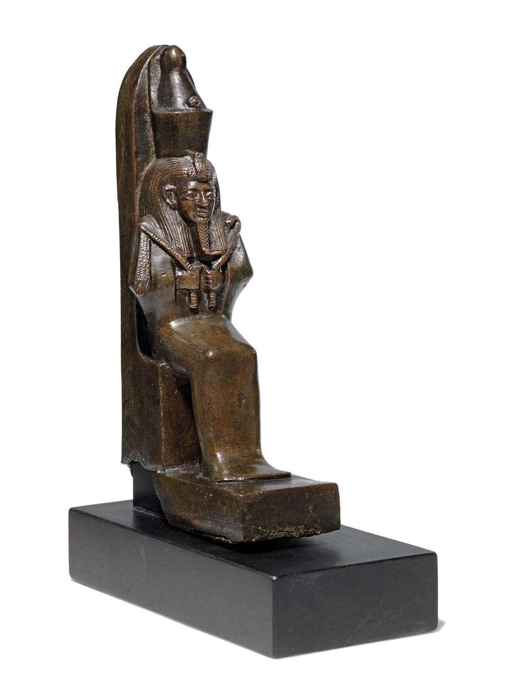 AN EGYPTIAN BRONZE ATUM, NEW KINGDOM, 19TH DYNASTY, CIRCA 1292-1185 B.C ...