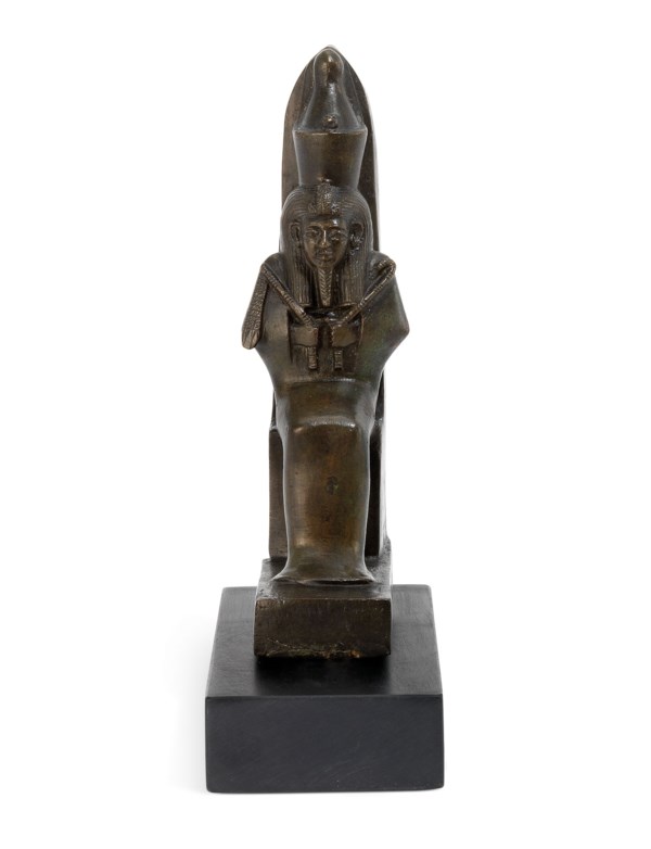 AN EGYPTIAN BRONZE ATUM, NEW KINGDOM, 19TH DYNASTY, CIRCA 1292-1185 B.C ...
