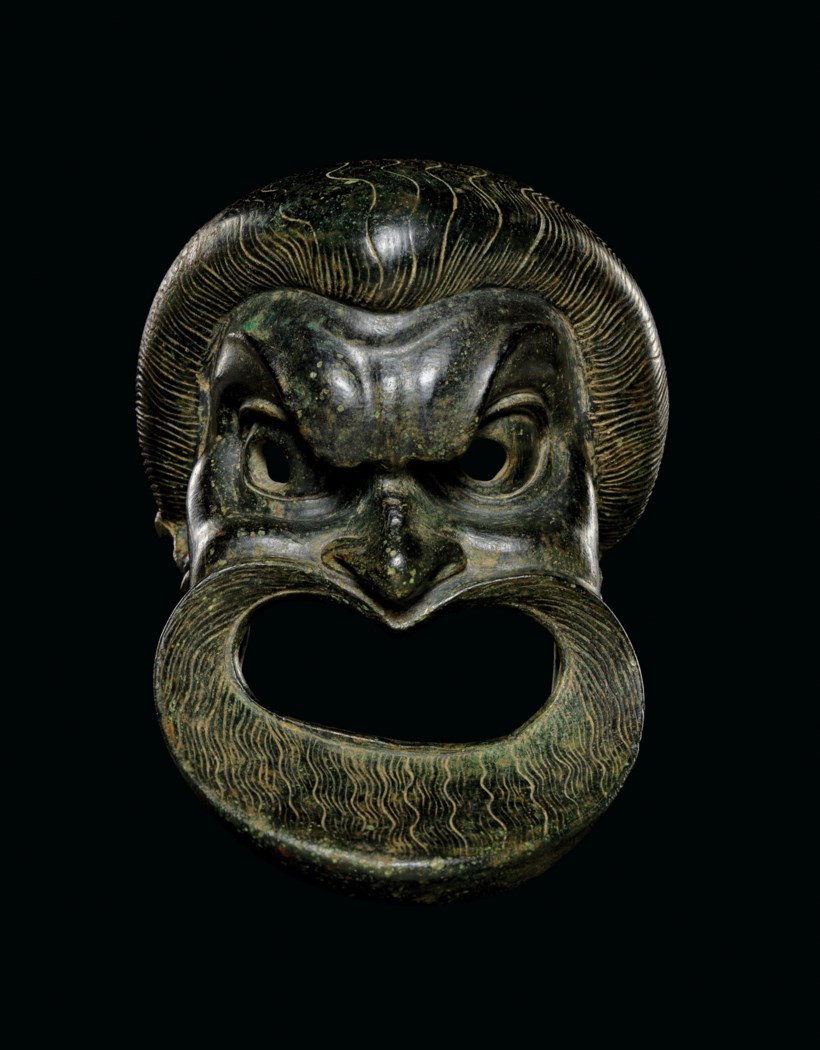 A ROMAN BRONZE MASK OF A COMIC ACTOR, CIRCA 1ST CENTURY A.D. | Christie's