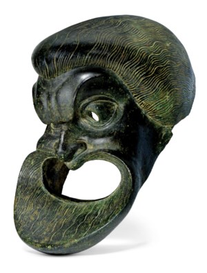 A ROMAN BRONZE MASK OF A COMIC ACTOR, CIRCA 1ST CENTURY A.D. | Christie's
