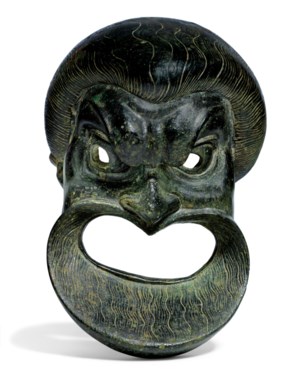 A ROMAN BRONZE MASK OF A COMIC ACTOR, CIRCA 1ST CENTURY A.D. | Christie's