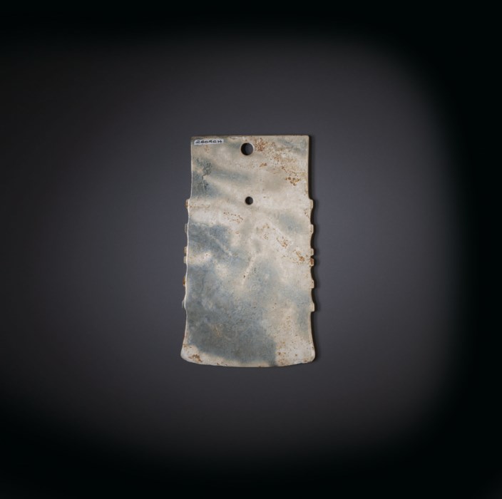 A FINE GREYISH-GREEN JADE AXE, QI, LATE SHANG-EARLY WESTERN ZHOU ...
