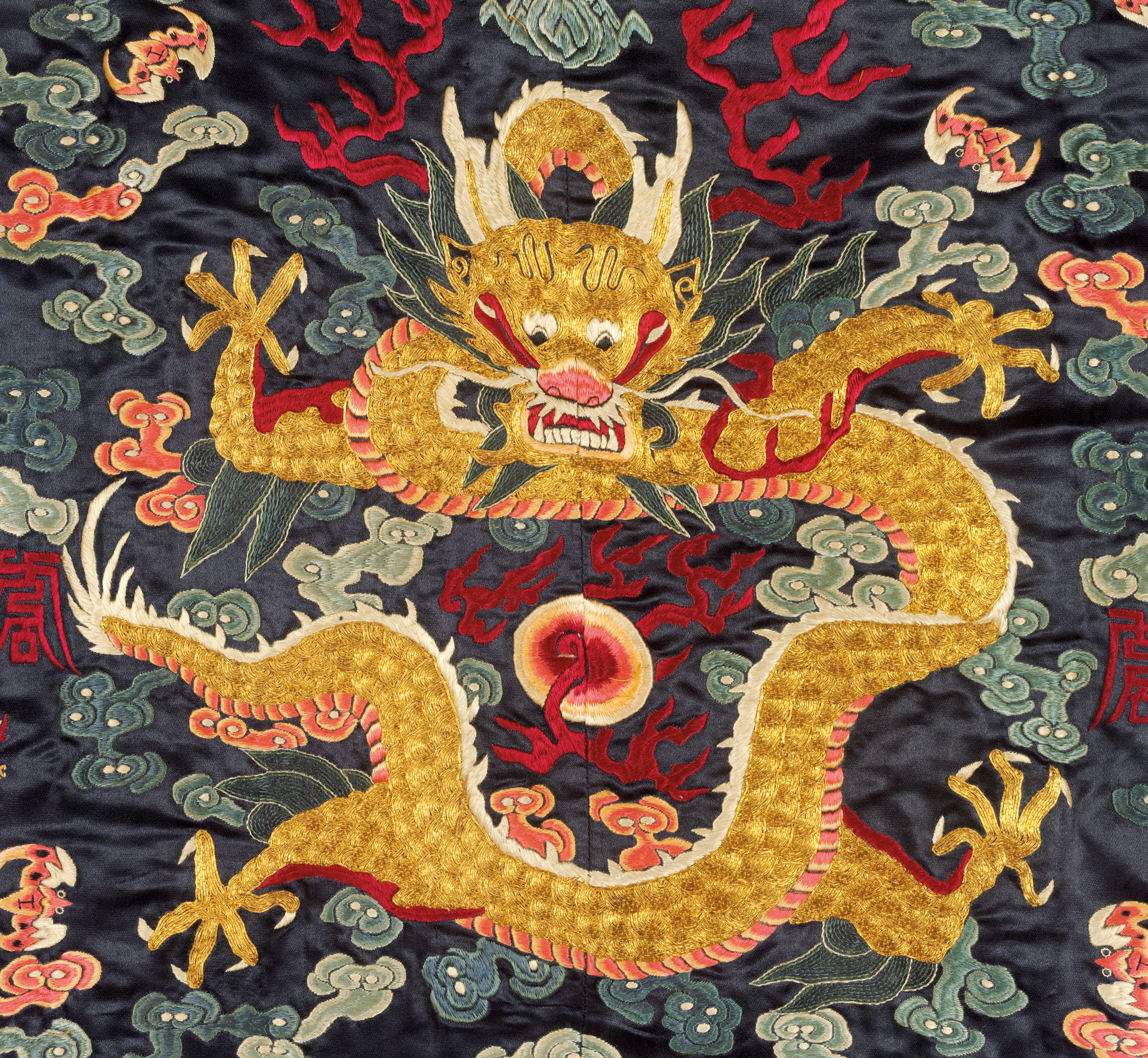 A BLUE-GROUND EMBROIDERED SILK TWELVE SYMBOL 'DRAGON' ROBE | Christie's