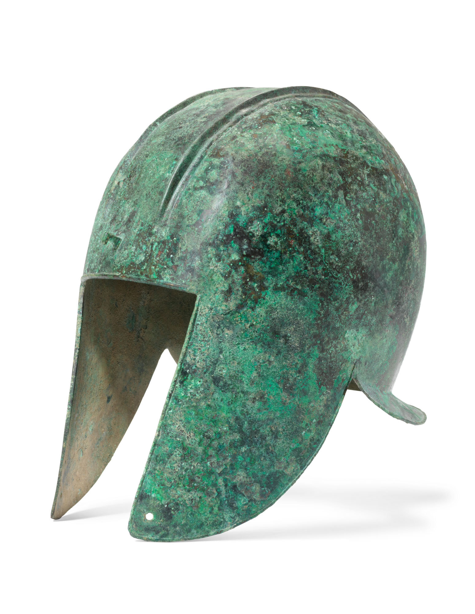 AN ILLYRIAN BRONZE HELMET, ARCHAIC PERIOD, CIRCA 6TH CENTURY B.C ...