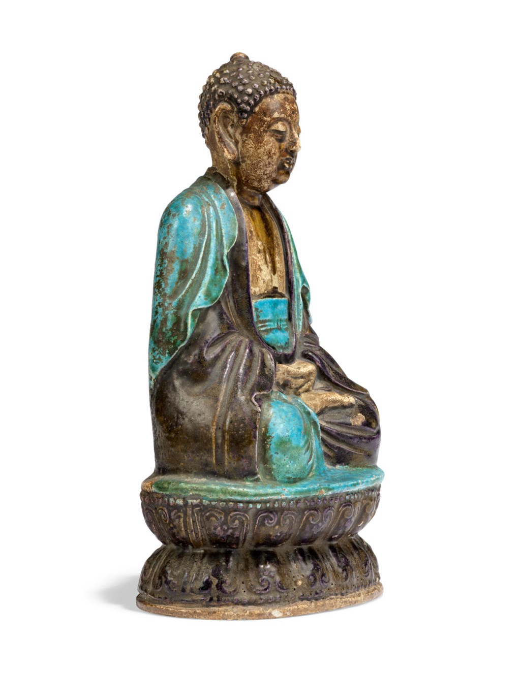 A CHINESE POTTERY FAHUA SEATED FIGURE OF SHAKYAMUNI, MING DYNASTY (1368 ...