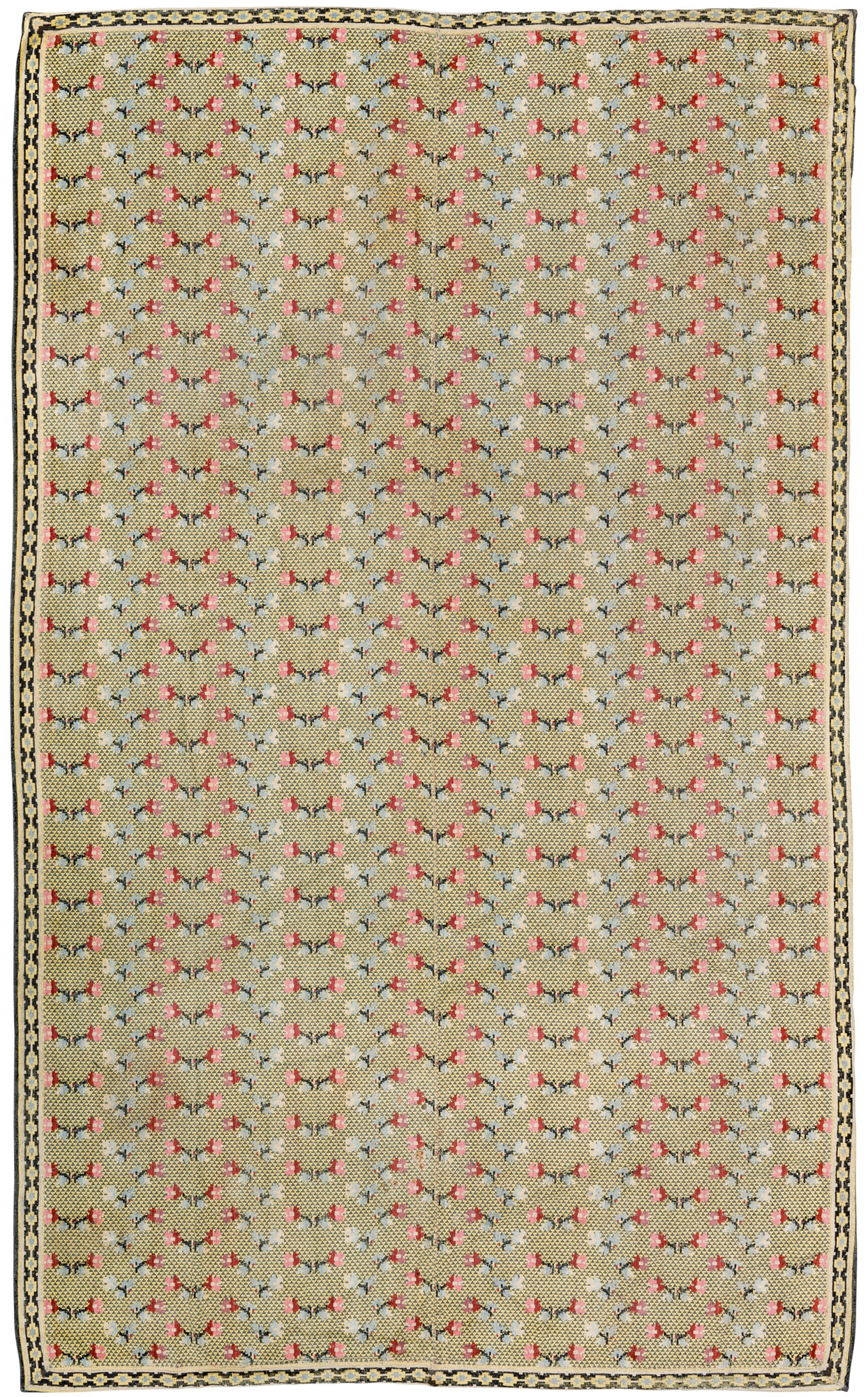 A FRENCH PINK, BLUE AND GREEN WOVEN CARPET, EARLY 20TH CENTURY | Christie’s