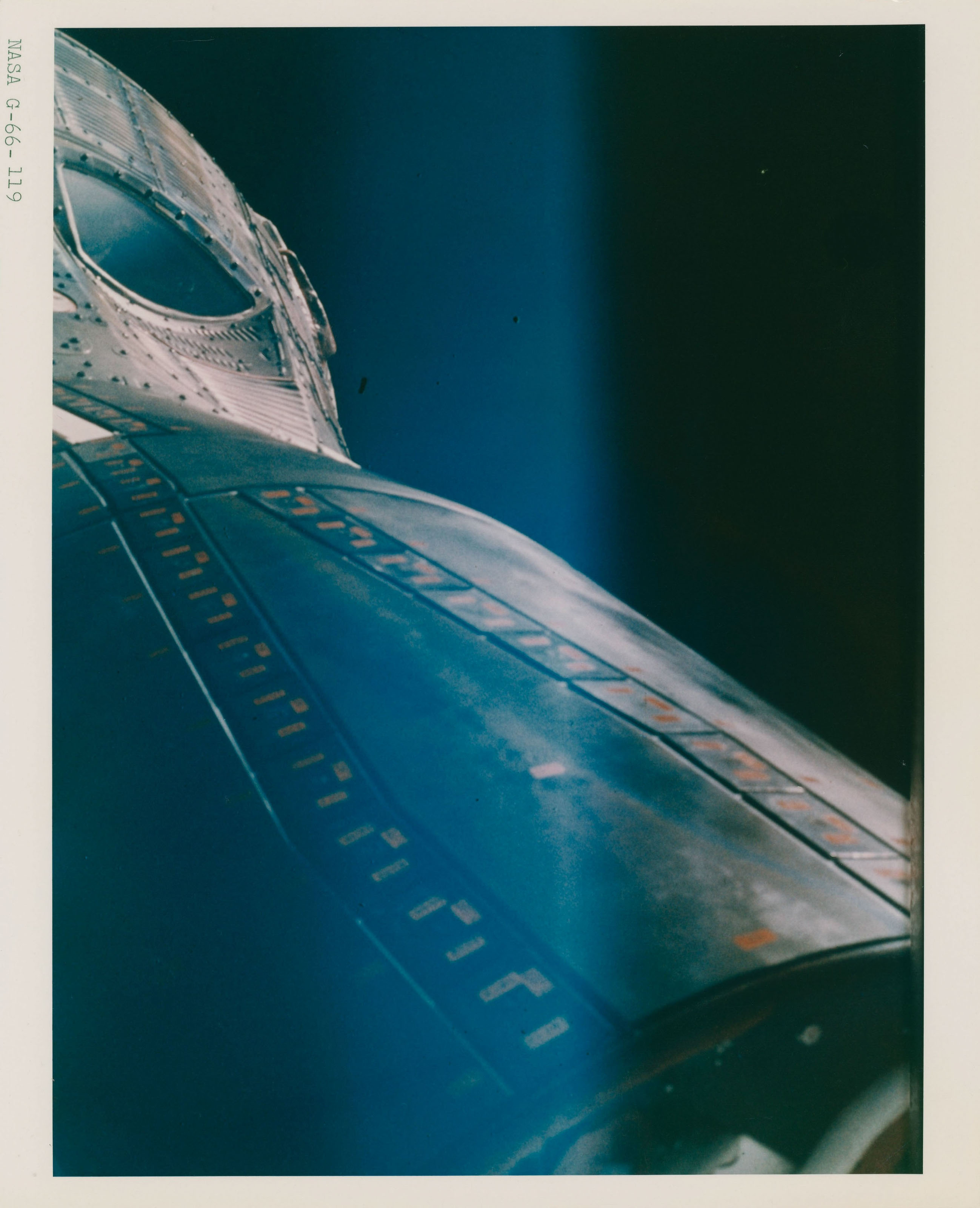 First EVA photograph and first photograph of a spacecraft in space ...