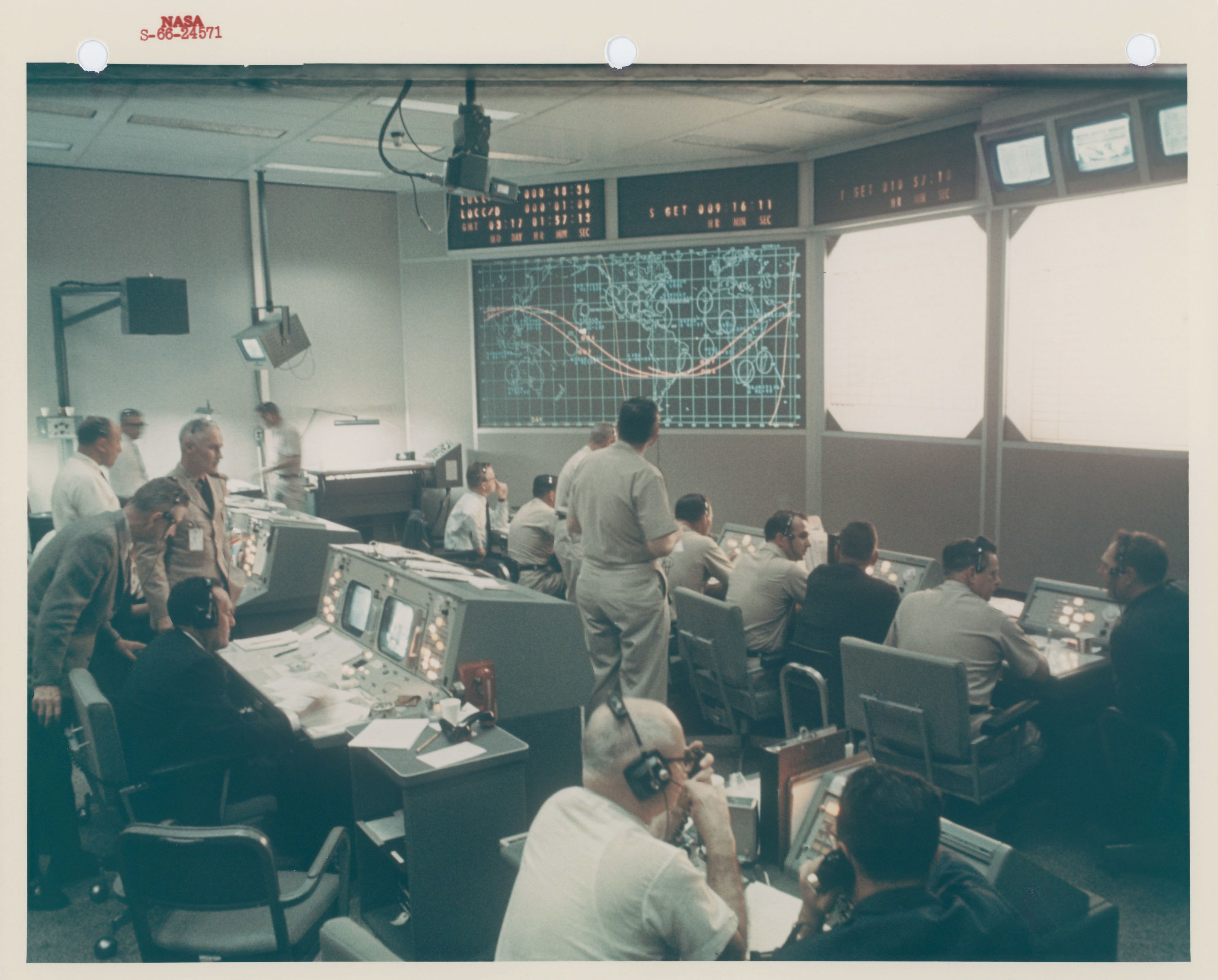 Mission Control during the emergency; first docking of two spacecrafts ...