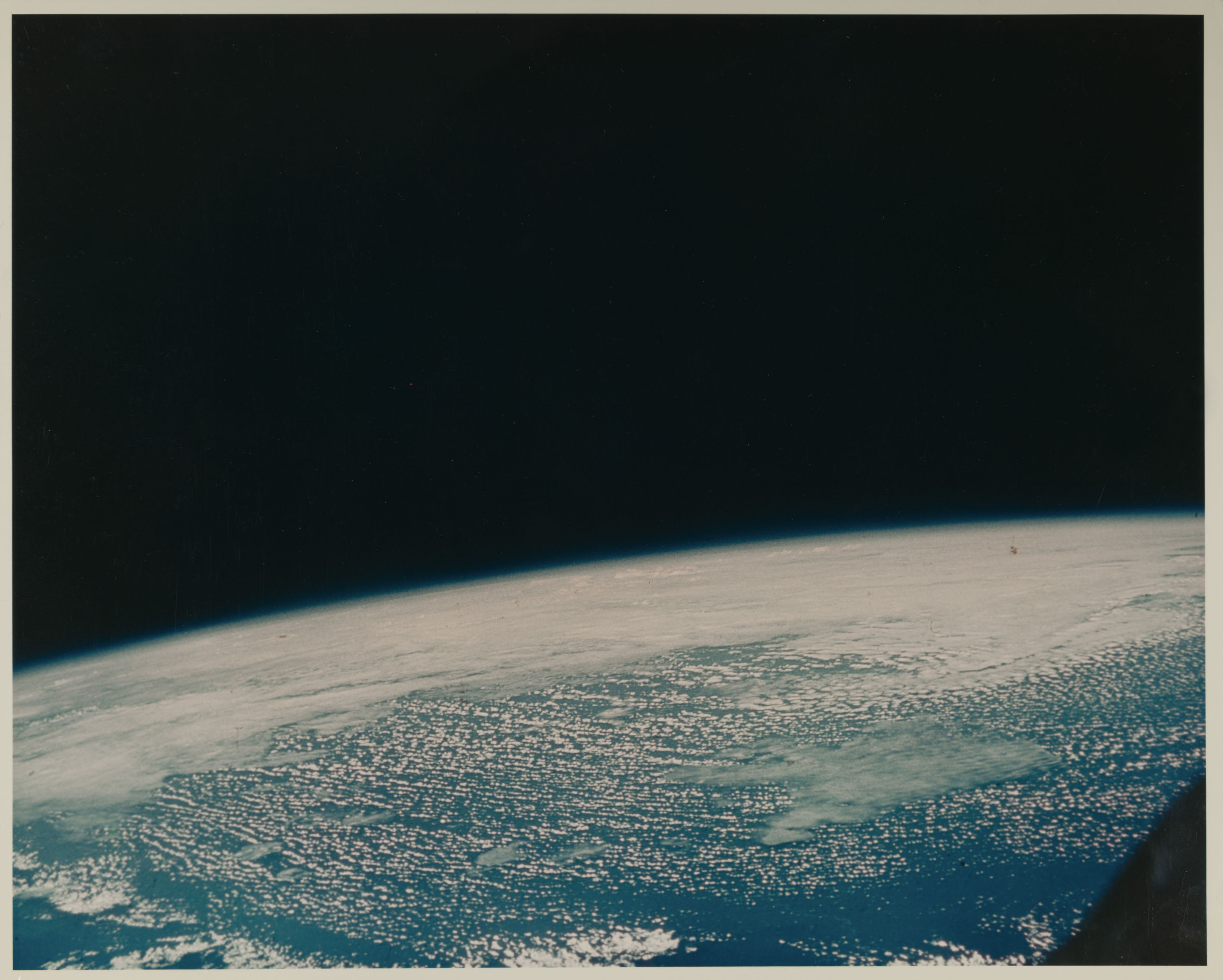 The blue Earth horizon and the black sky of space [Large Format], June ...