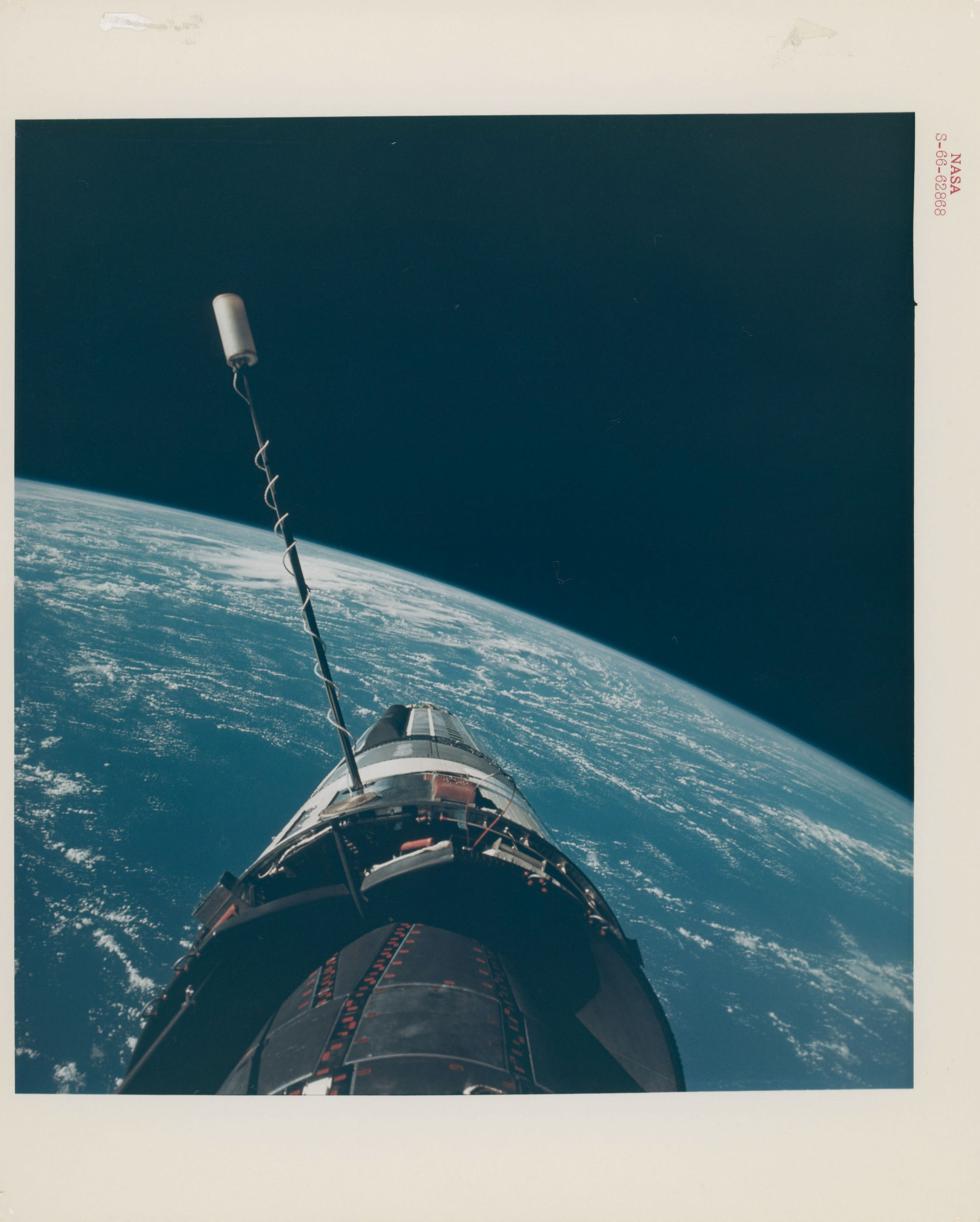 EVA photograph: Gemini XII docked with Agena over the Pacific Ocean ...