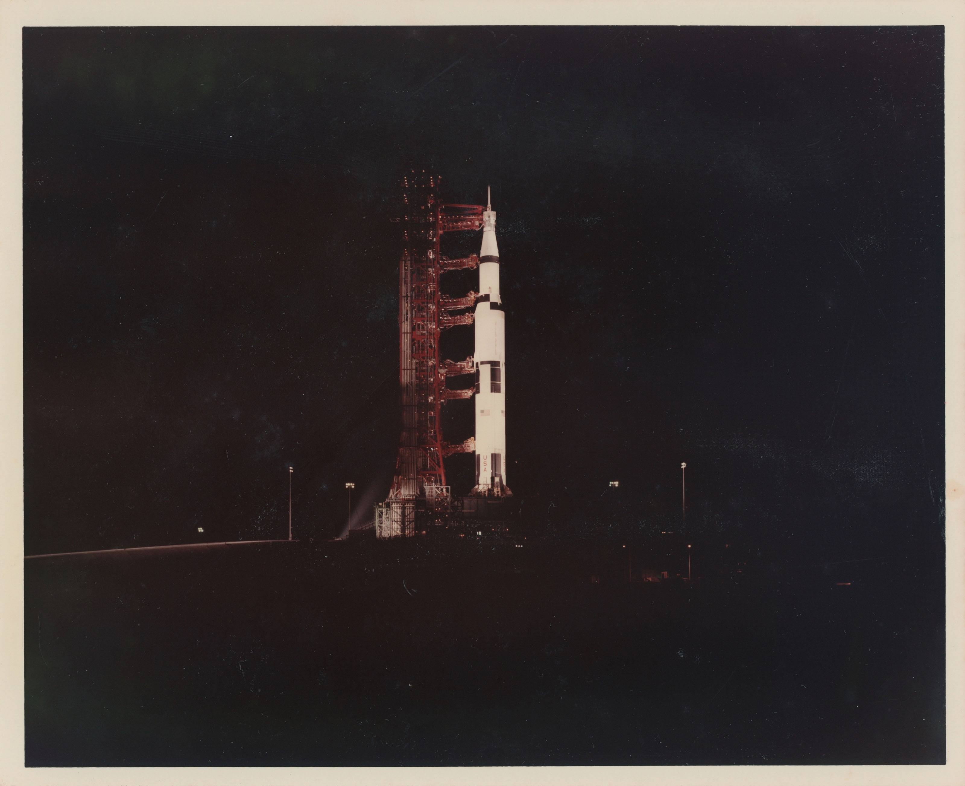 The first rocket to send humans to another world; the mission emblem ...